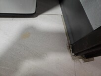 In front of the fridge