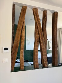 Bathroom is open to bedroom