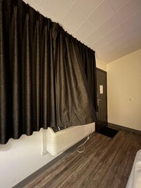 Poor planning here with the AC and drapes