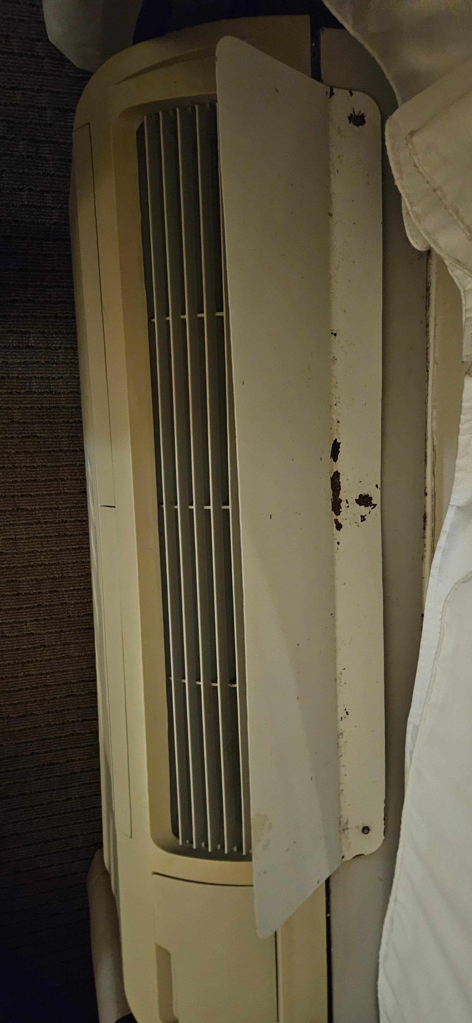 Dirty, rusty AC unit