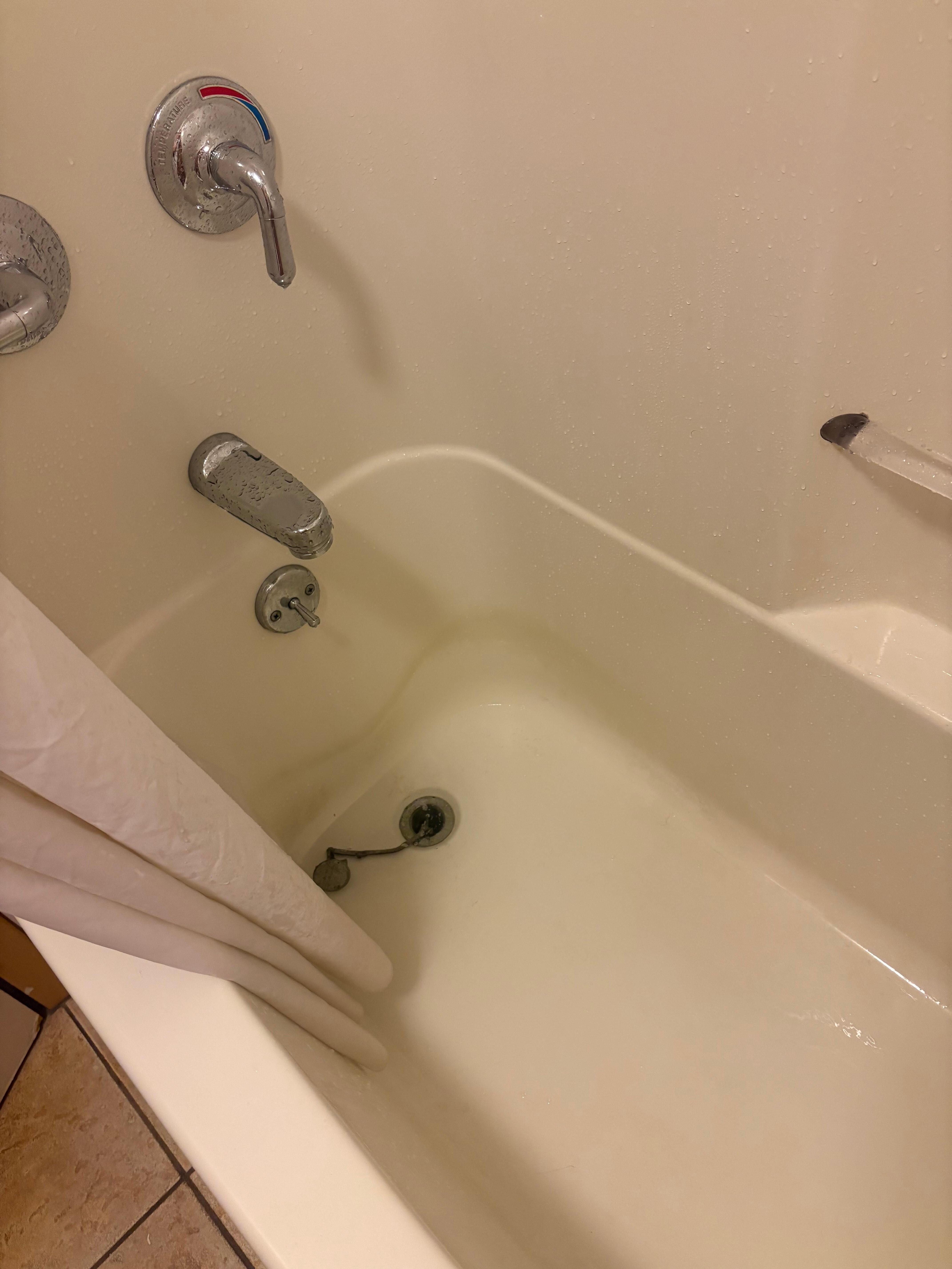 Shower drain Broken and clogged with other peoples old hair