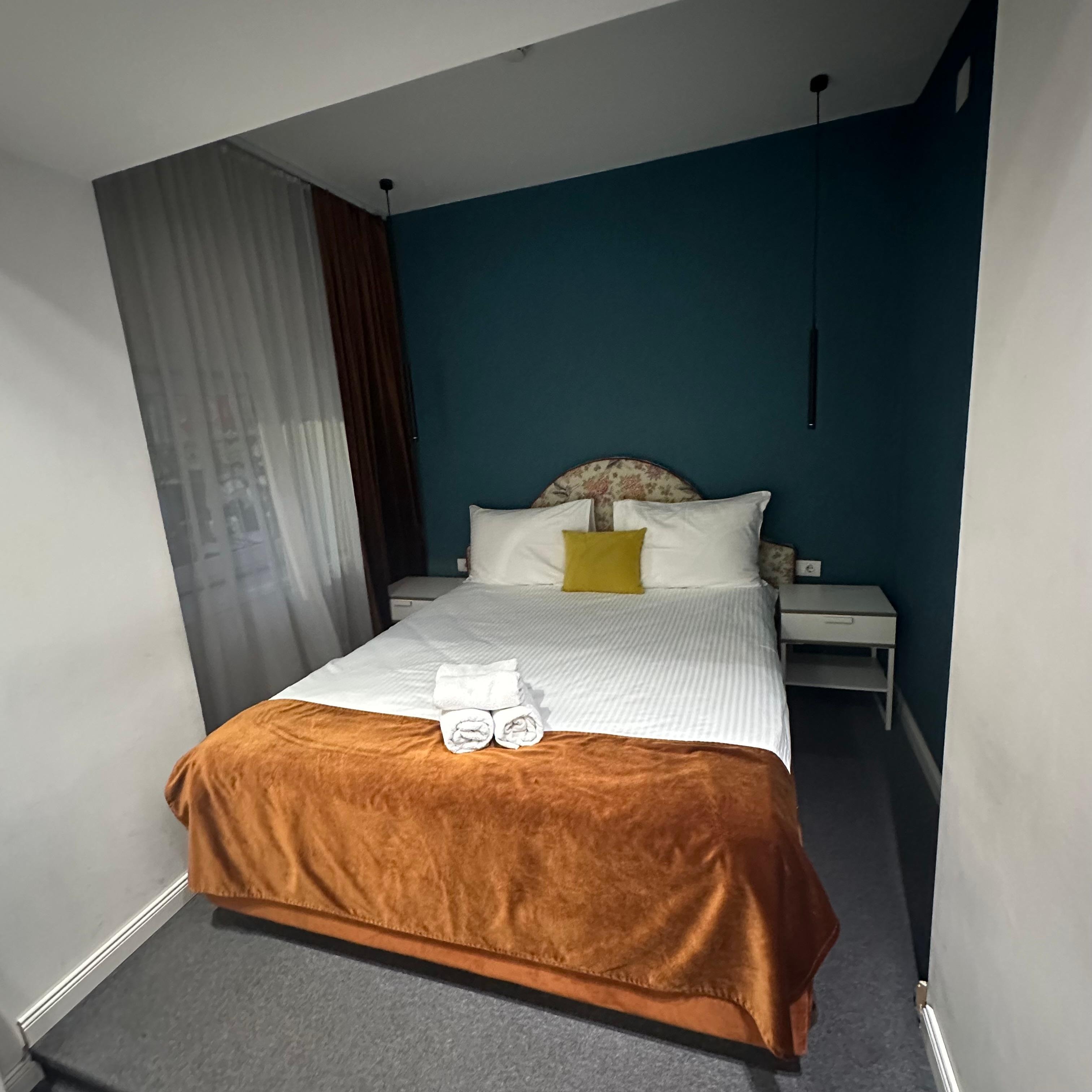 Bed isn’t cushy but comfortable enough. Bedding is too short/narrow though. Wouldn’t want to share with someone. 