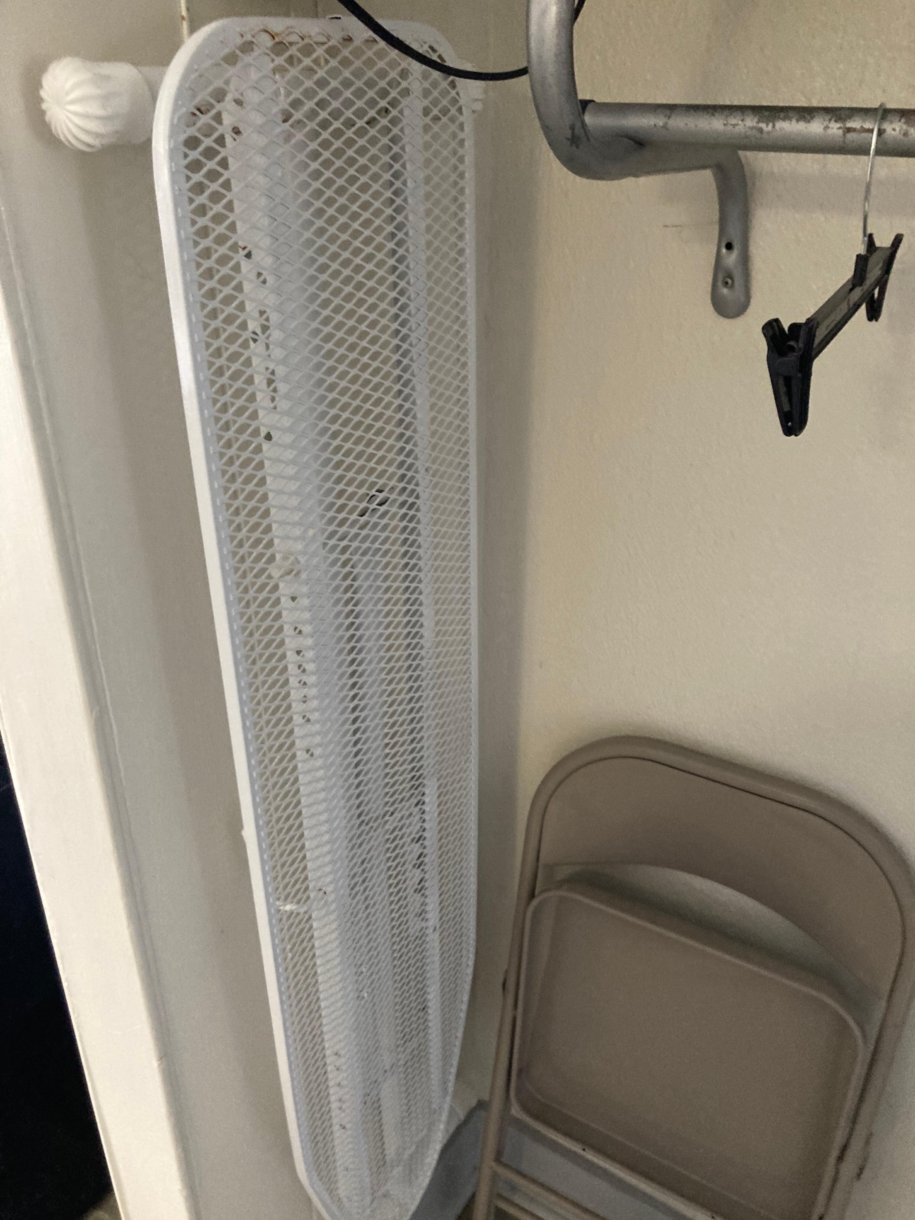Folding chair for the room and ironing board without pad