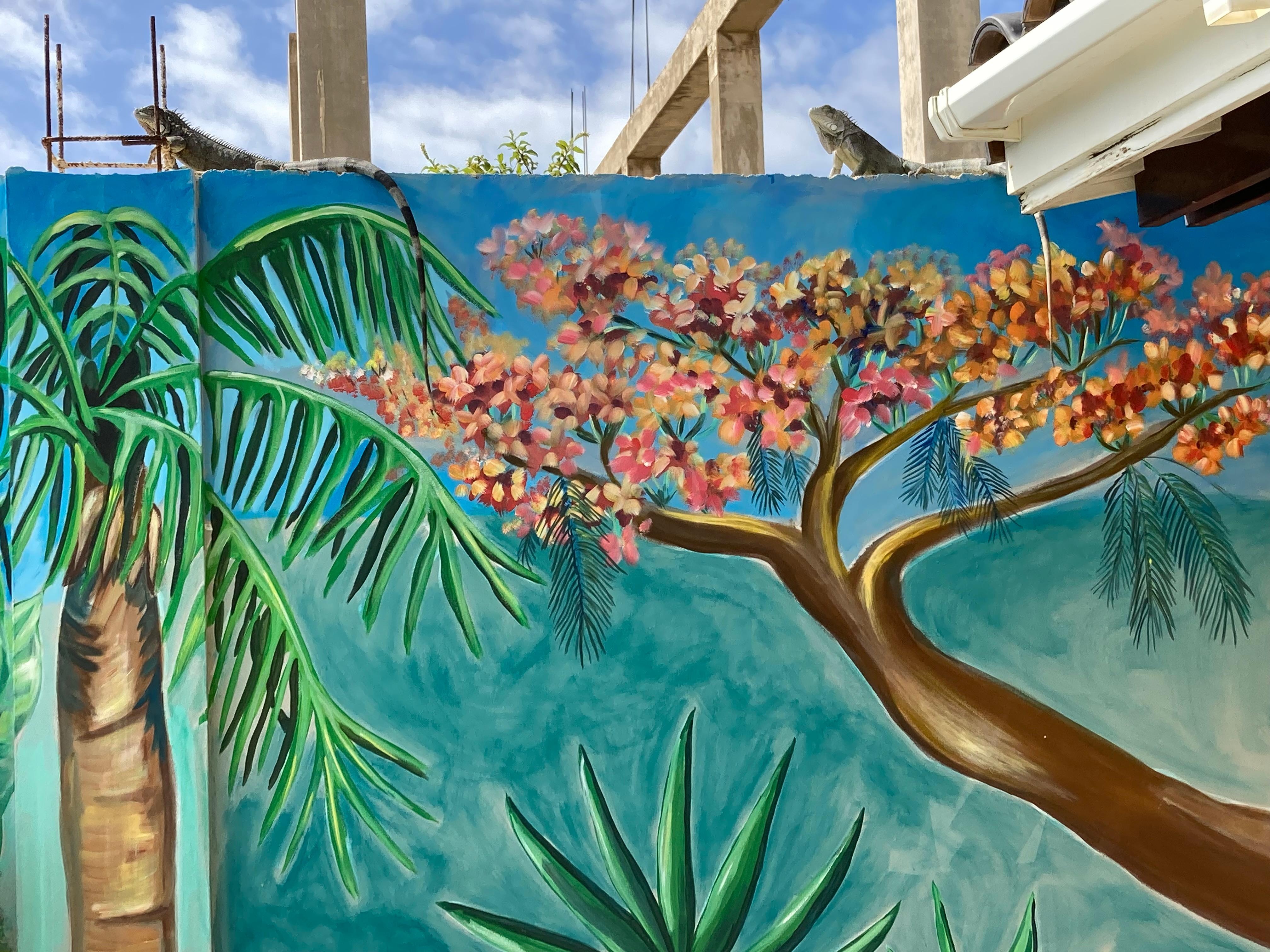 Mural around the pool with iguanas to keep us company. 
