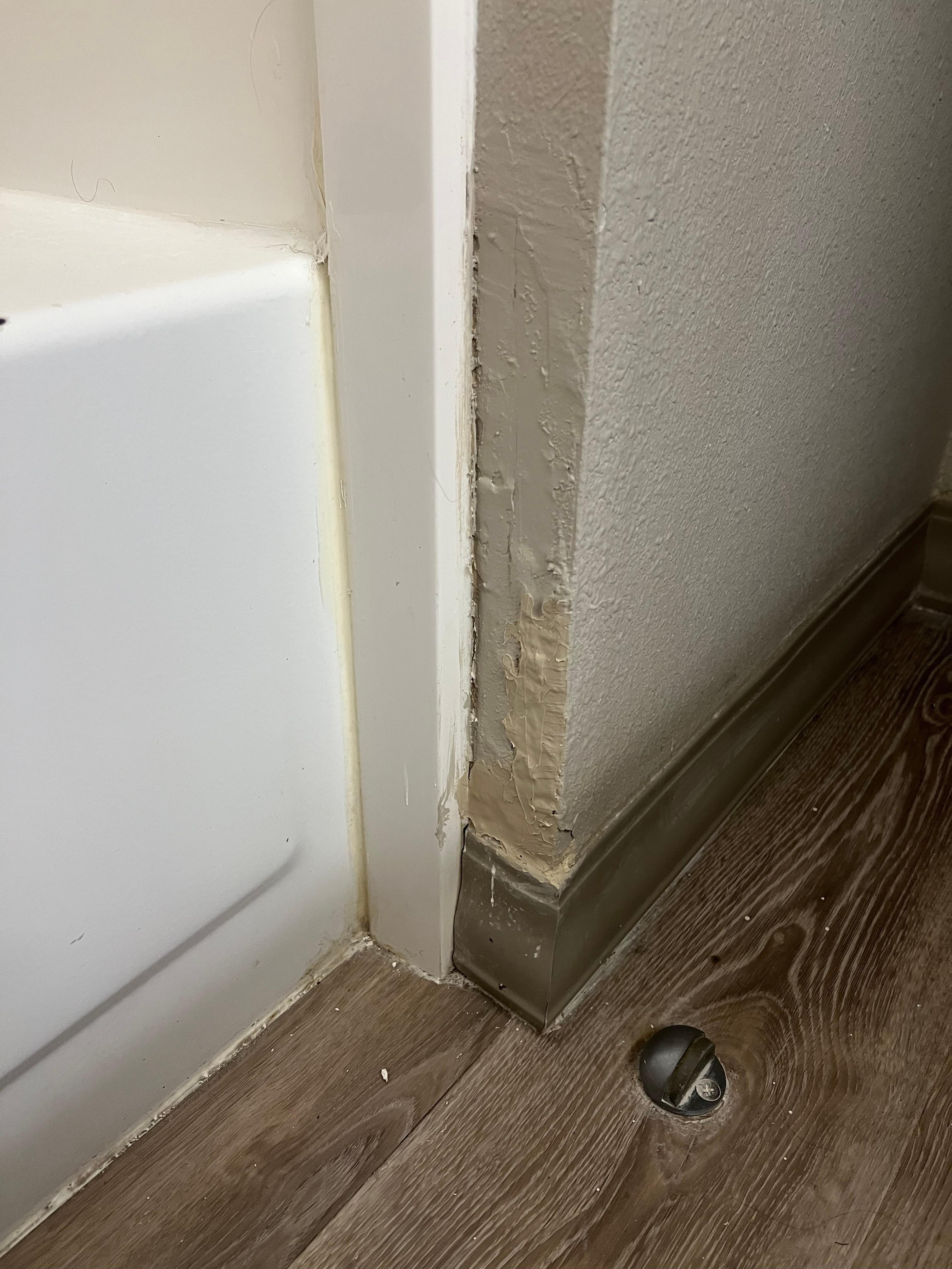 Water damaged bathroom wall