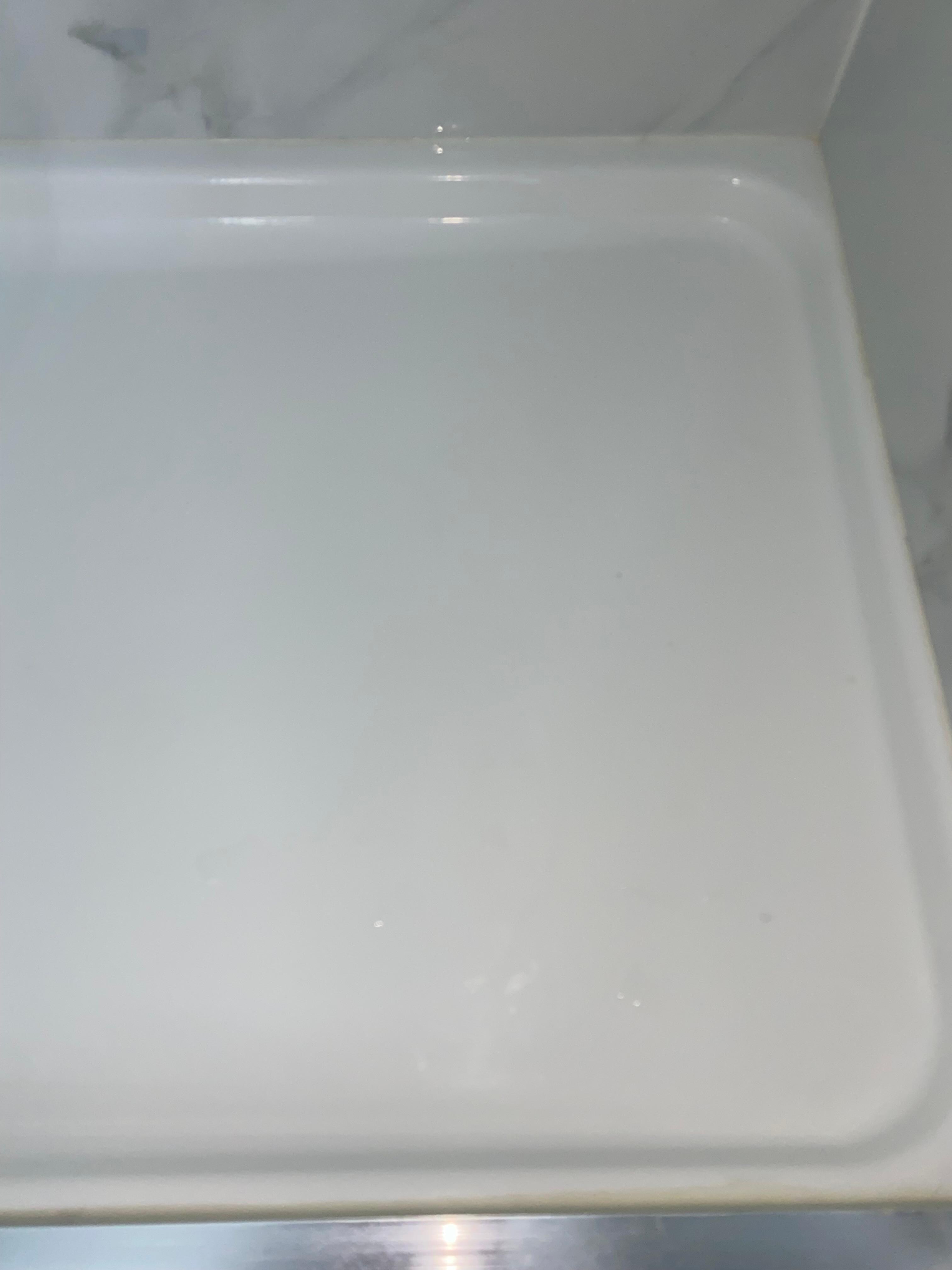 Tiny hairs on shower basin