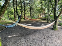 Relaxing in a hammock next to the infinite pool