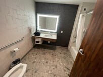 ADA bathroom had plenty of support bars for me.