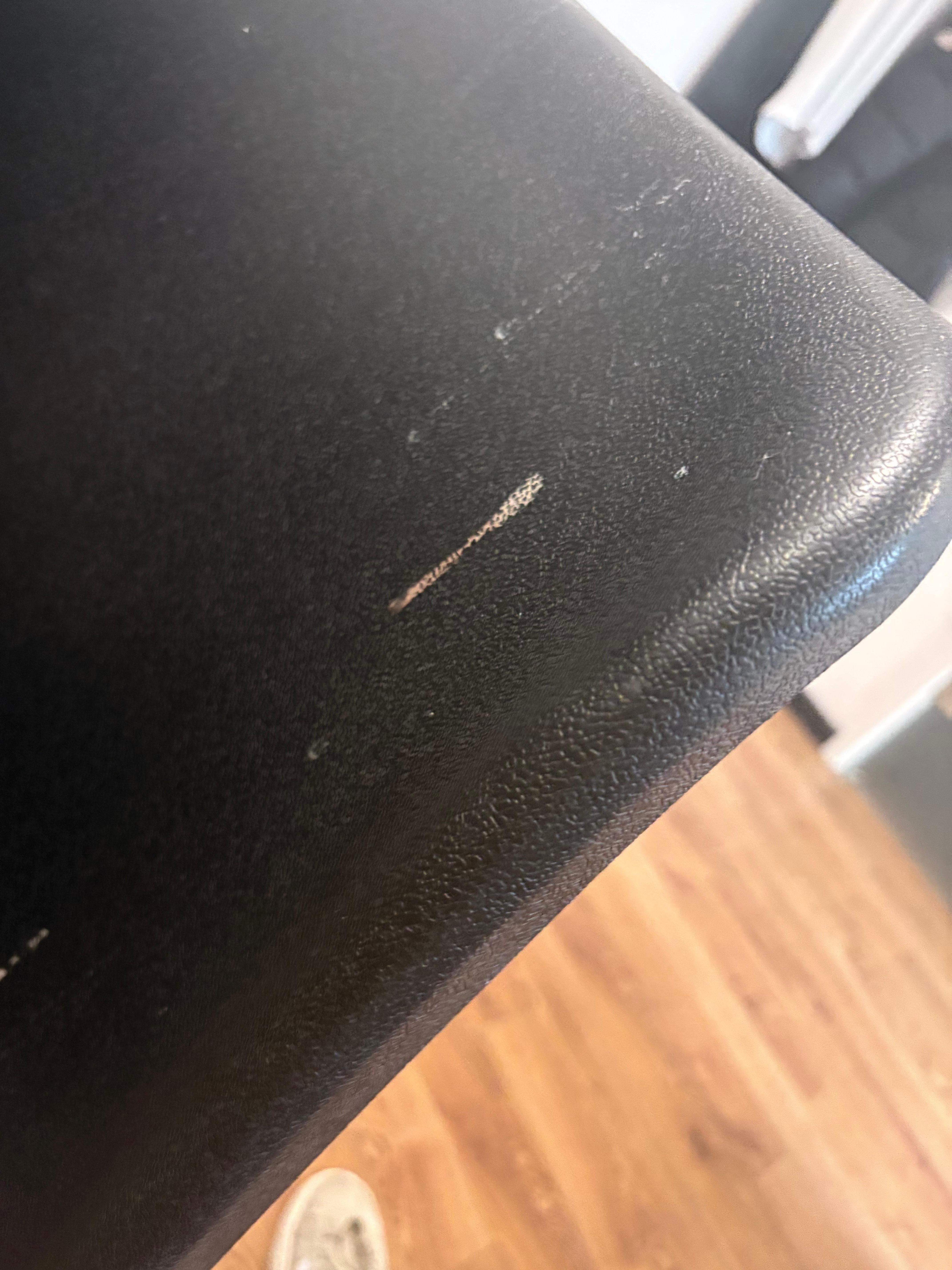 dirty marks on the chair. 