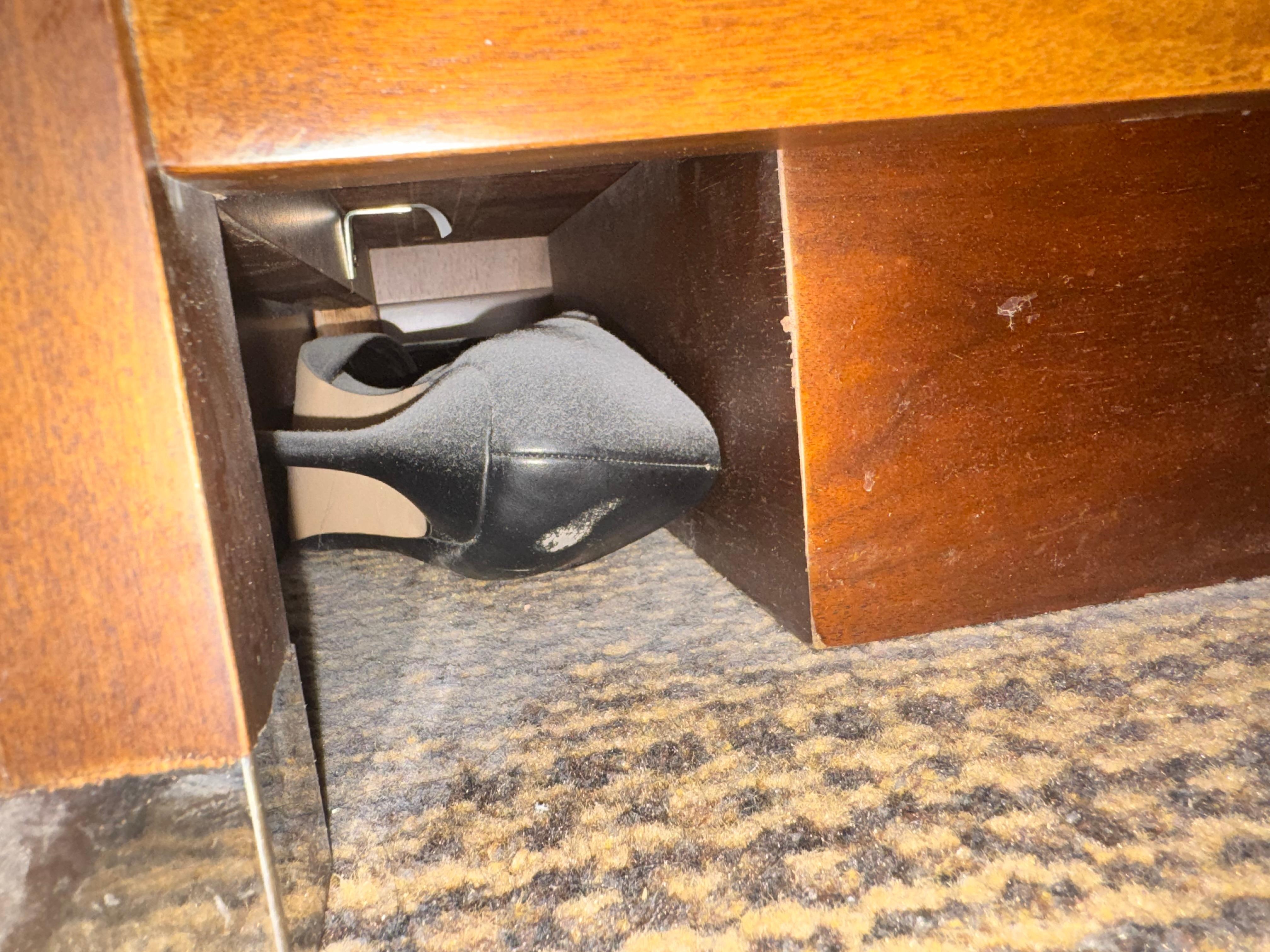 Under closet in small hole. 