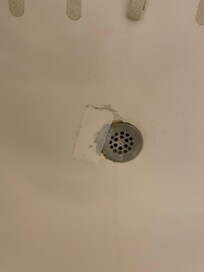 Shower drain was taped.