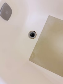 Rusty ring around the drain.