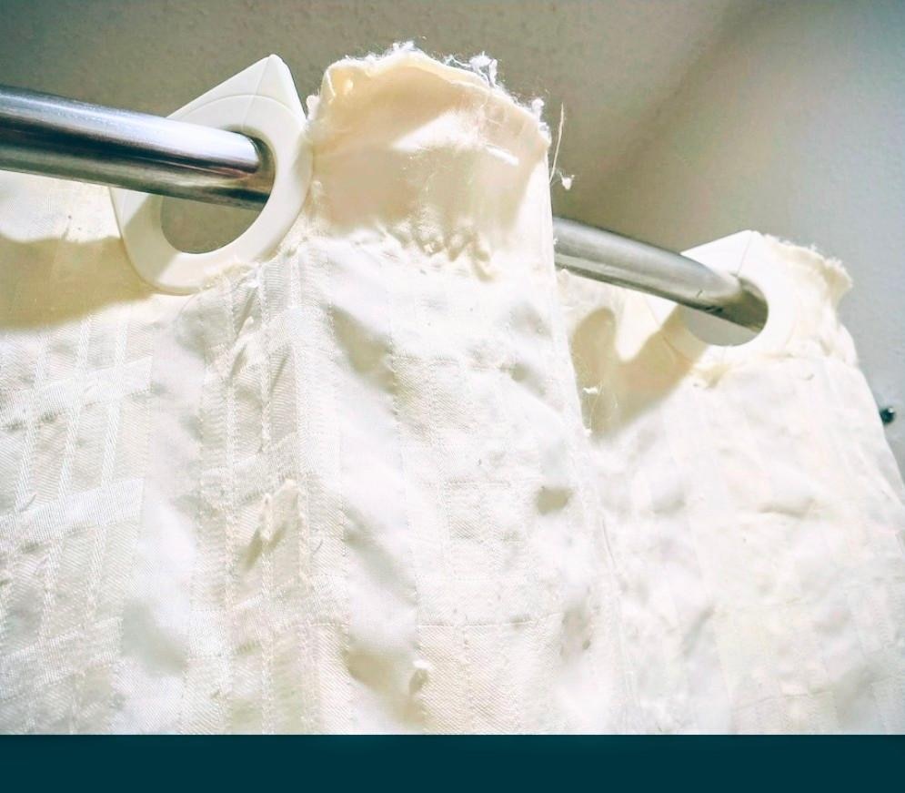 Yellow dirty smoke stained shower curtain 