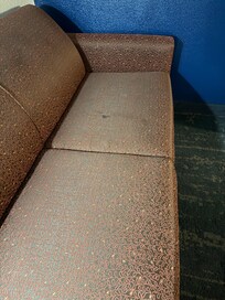 Filthy pullout sofa with stains. Not touching.
