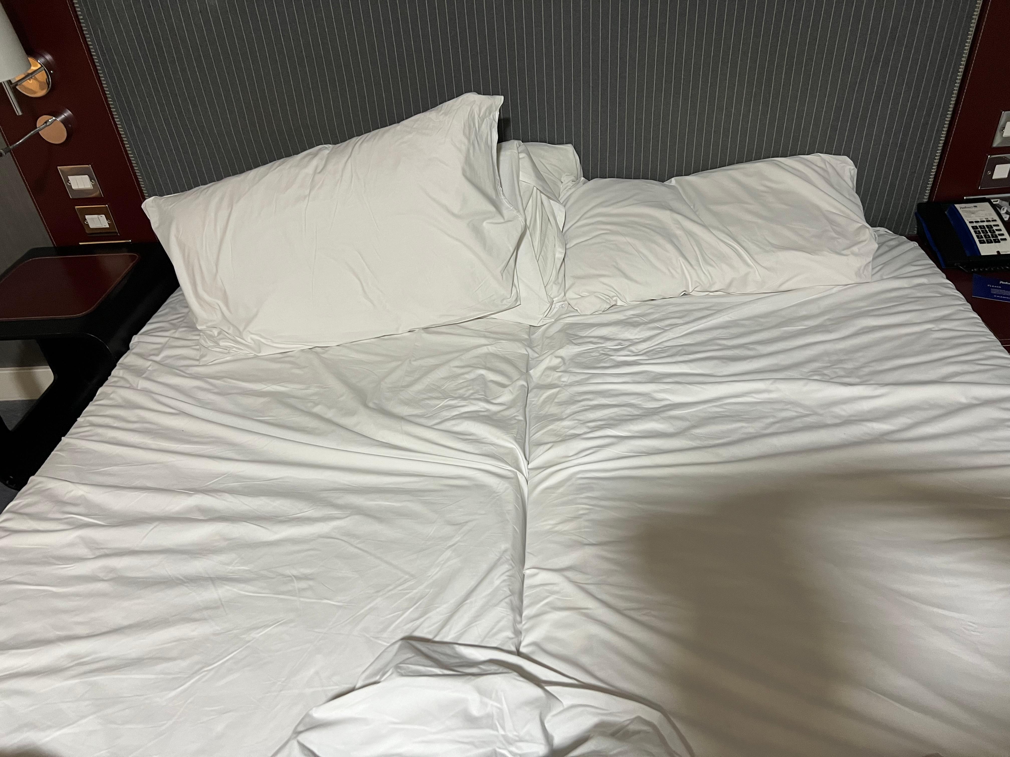 Two singles pushed together is not a king bed.