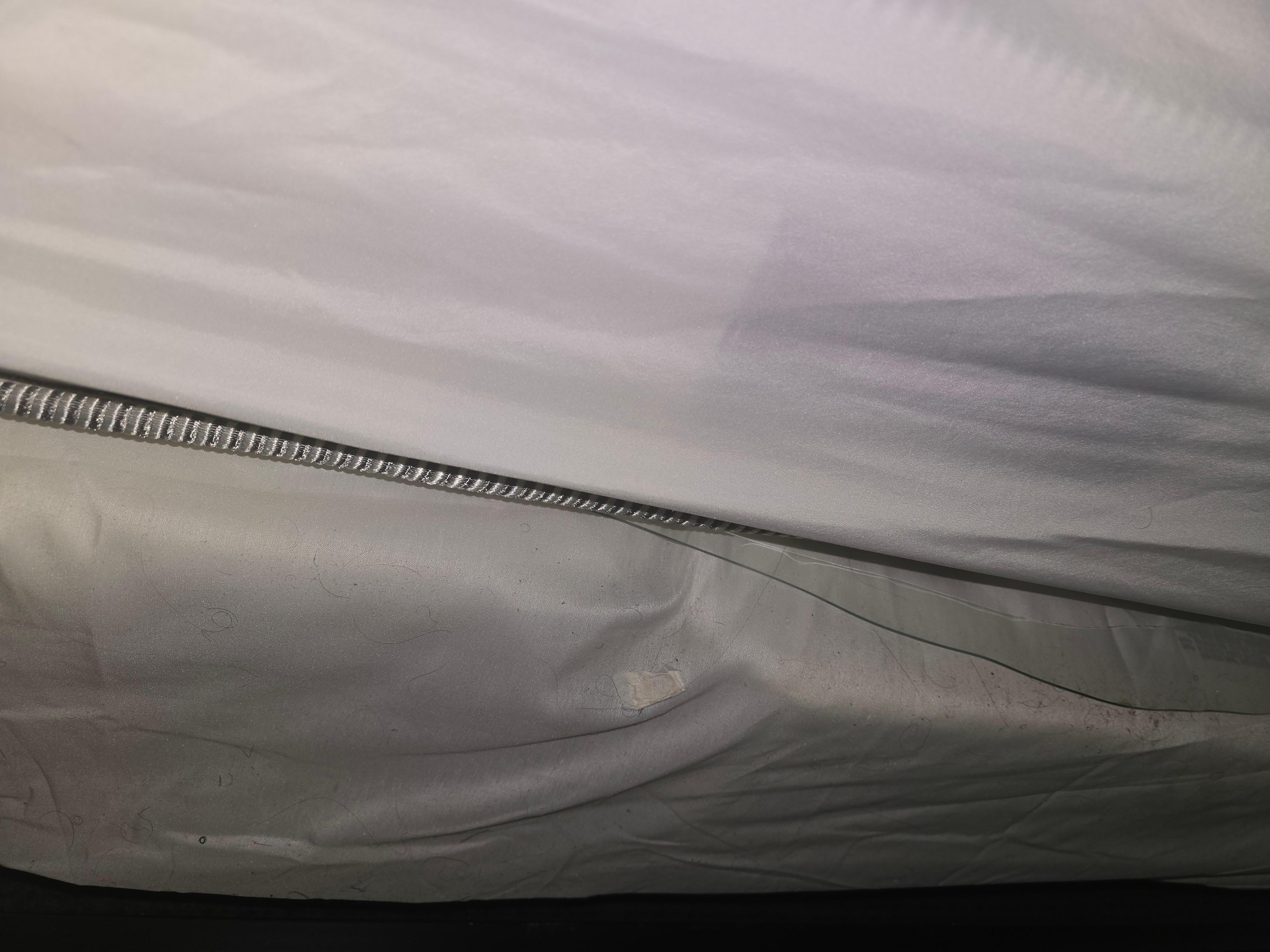 Glass wedged between mattress and box spring