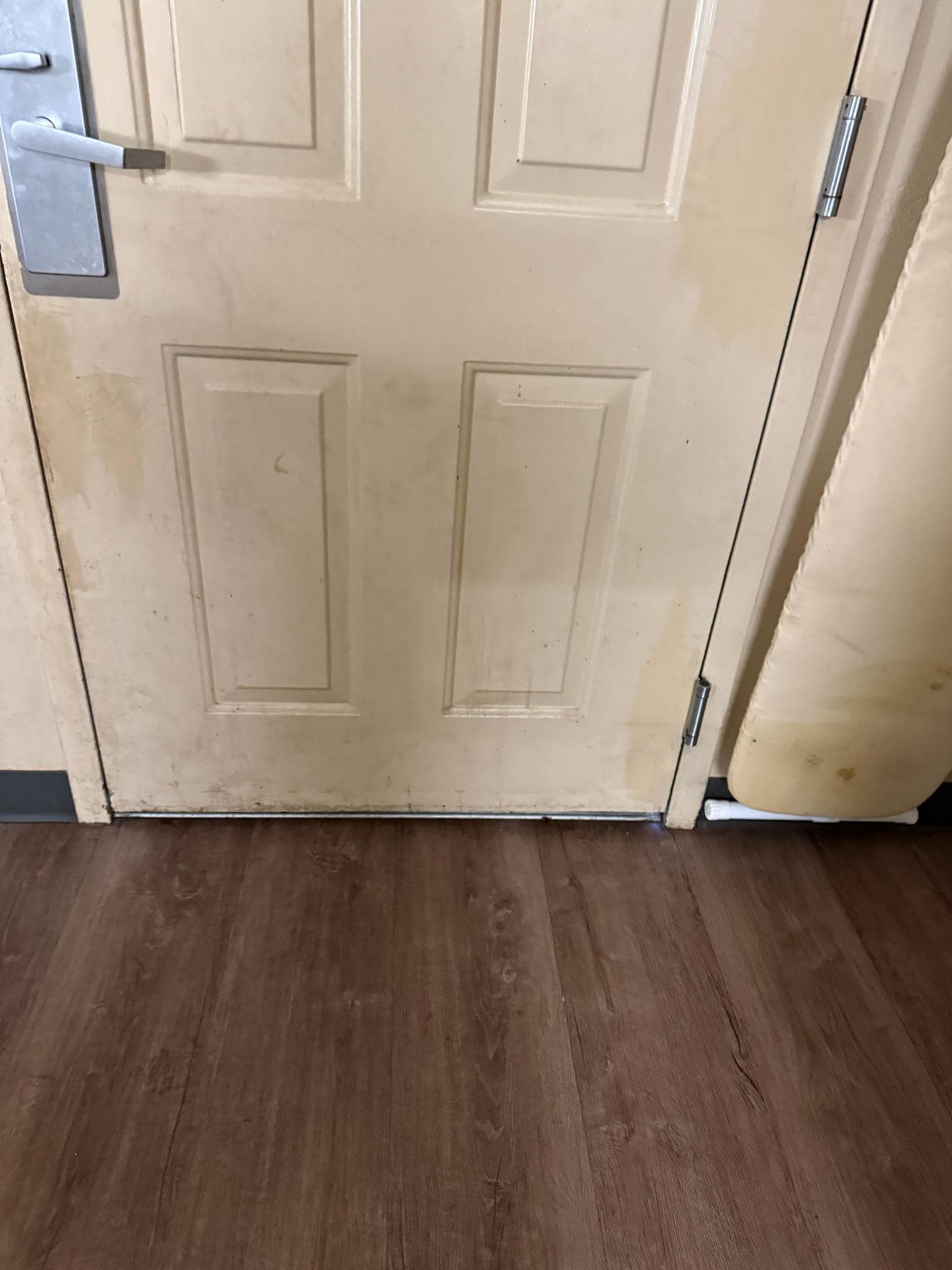 Blood and other stains on door.