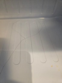 Hair and stains in the refrigerator