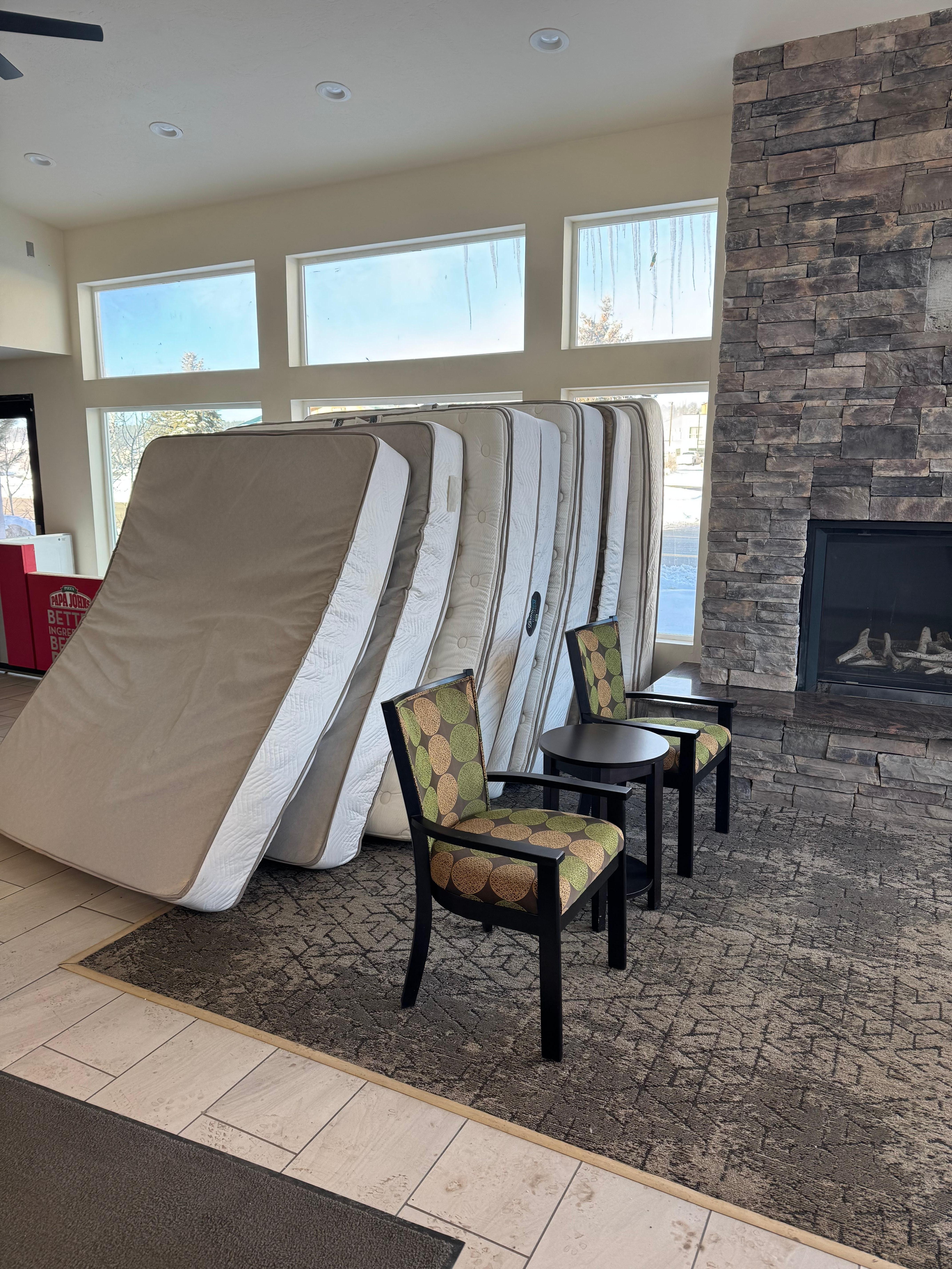 old dirty mattresses in the lobby. the stairwells are also stuffed with mattresses that look worse. 
