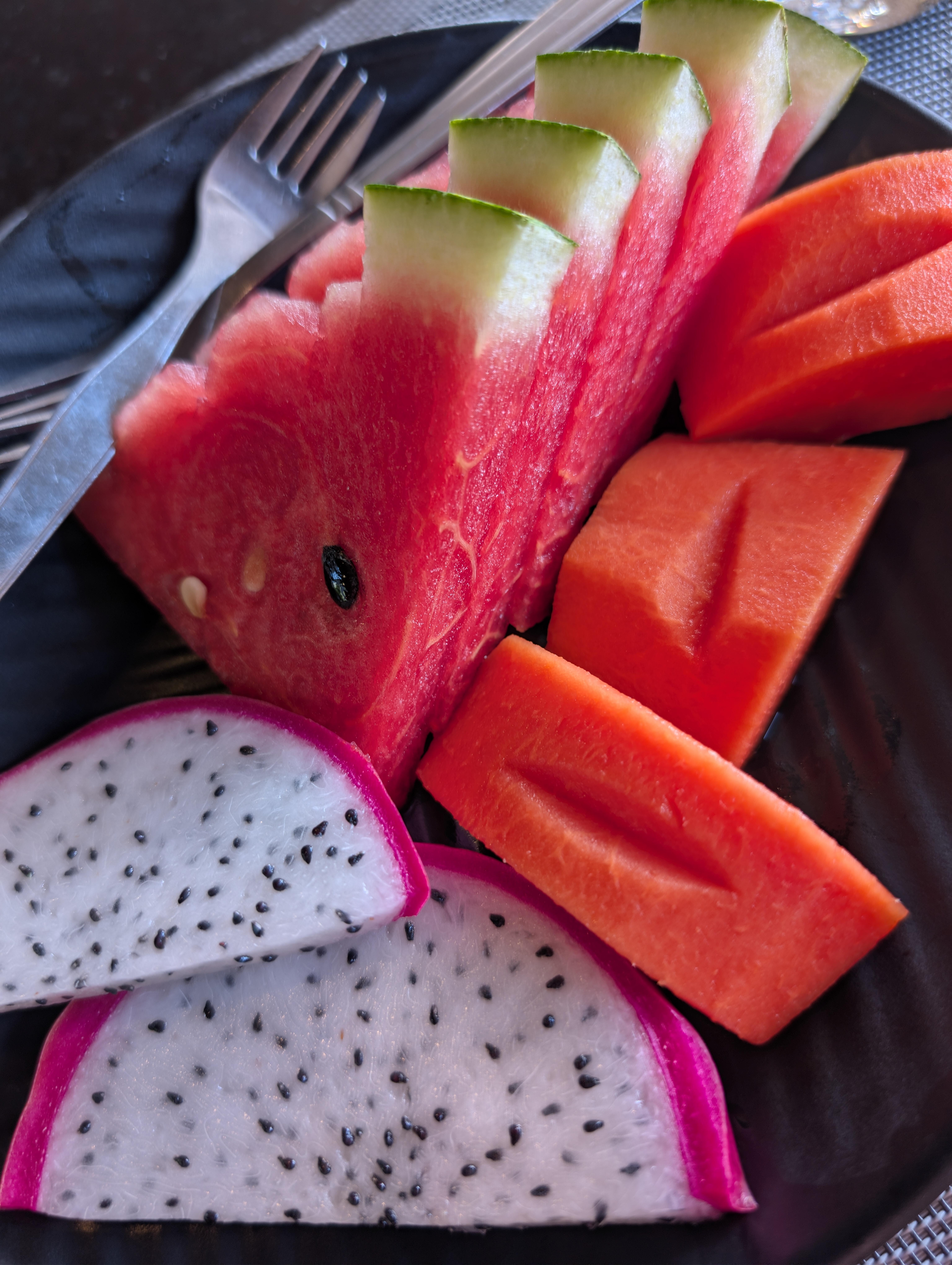 Fresh fruit from breakfast - passion fruit, Papaya, and watermelon 