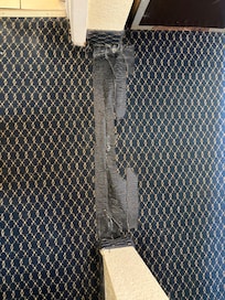 Carpet taped here on top. Unknown reason or condition