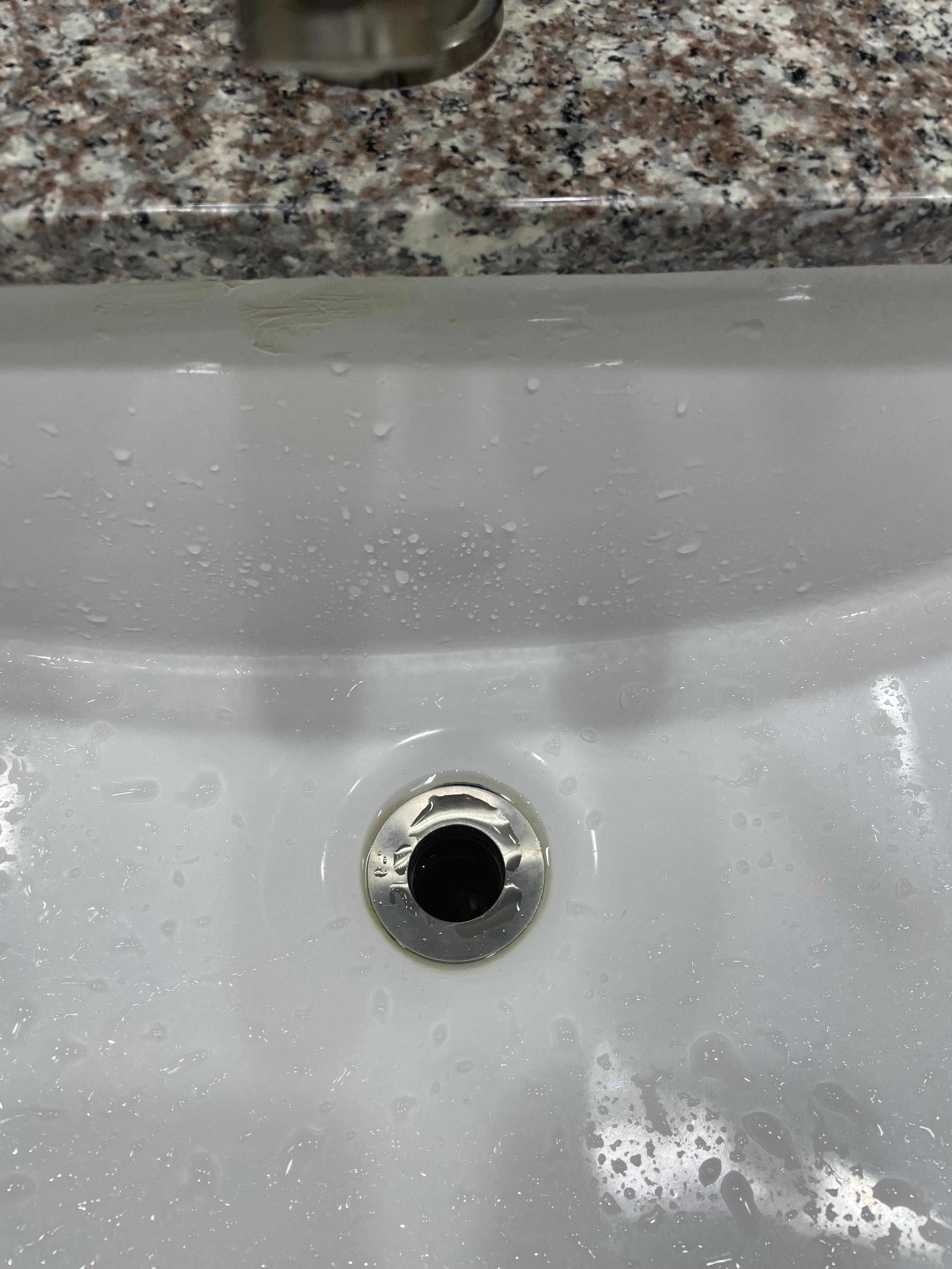 No stopper in sink. Nasty stuff down in the drain that was very visible. 