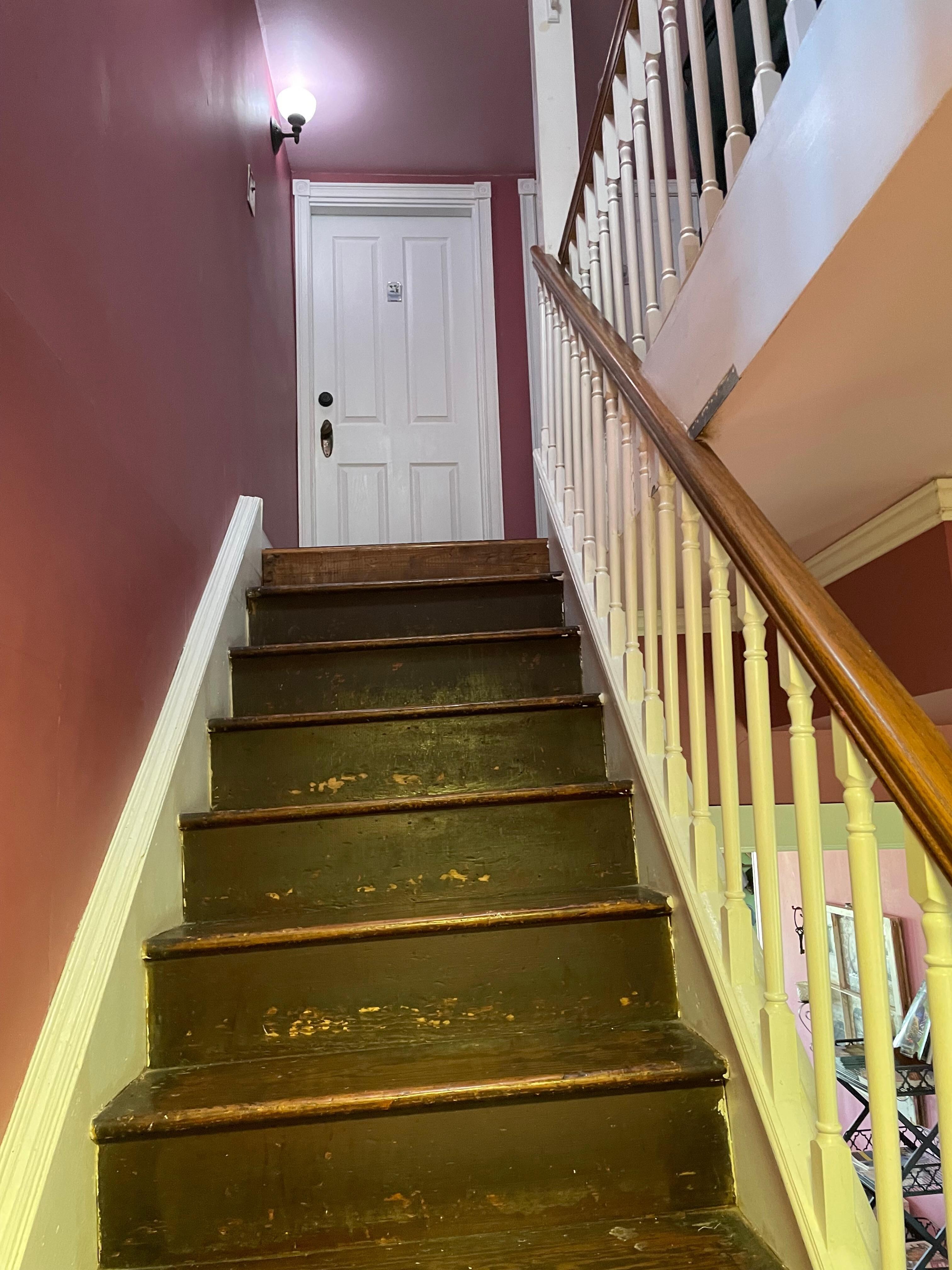 The stairs and door to our room.