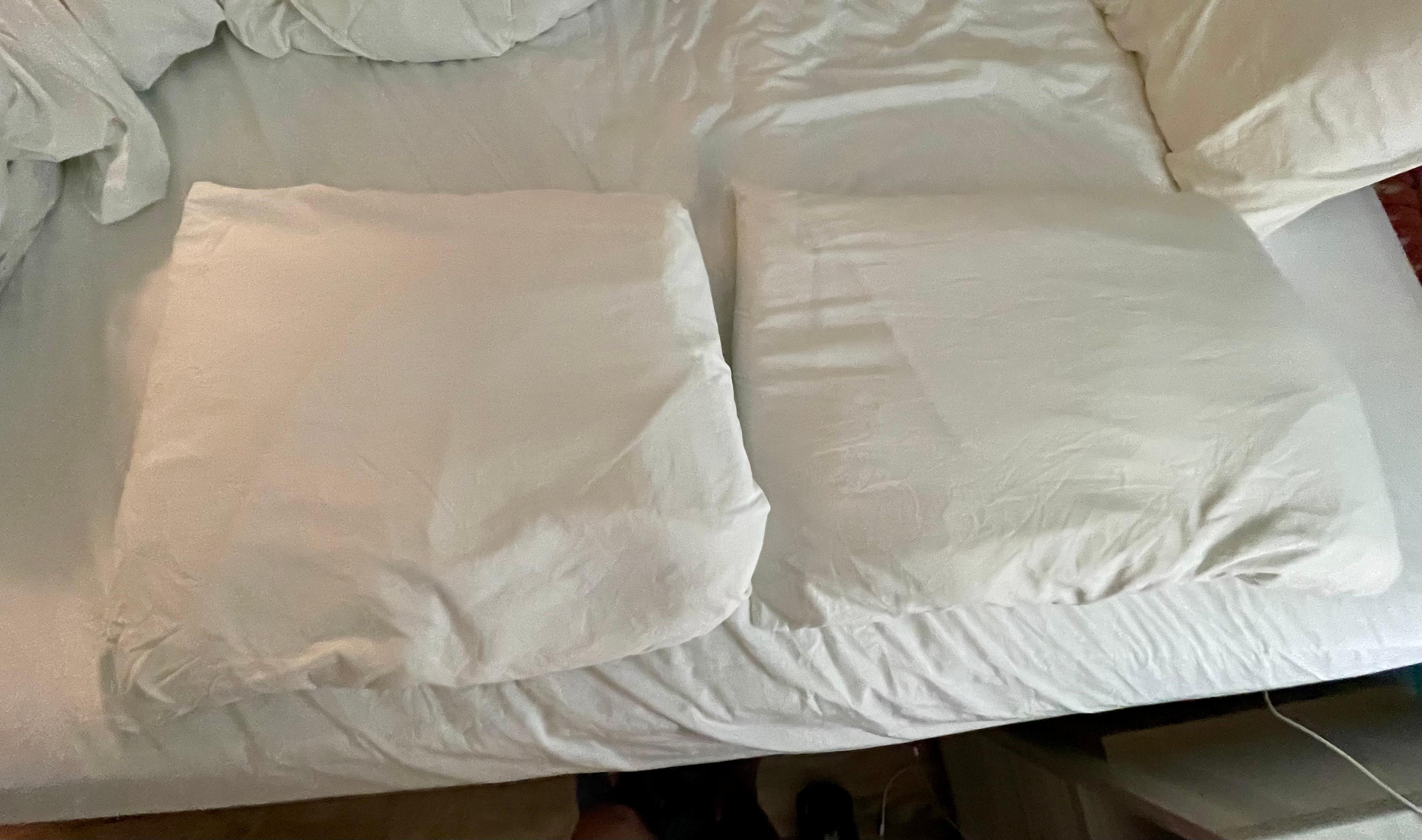 Pillows were small squares. Reminded me of throw pillows. Not comfortable.