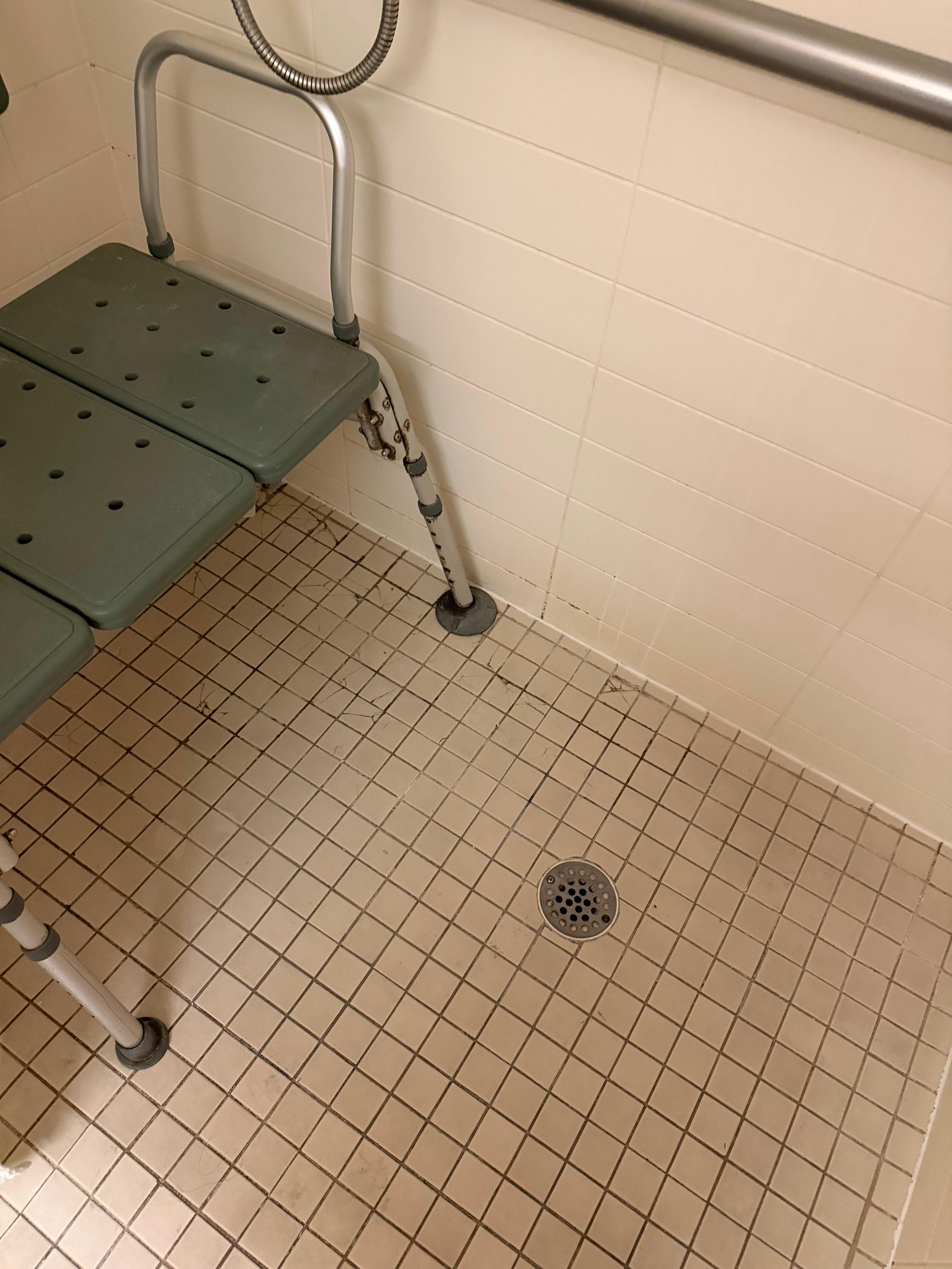 DIRTY ASS RESIDENT CHAIR WITH WATER RESIDUE AND MOLD