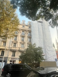Scaffolding and tarpaulin covering most of the hotel