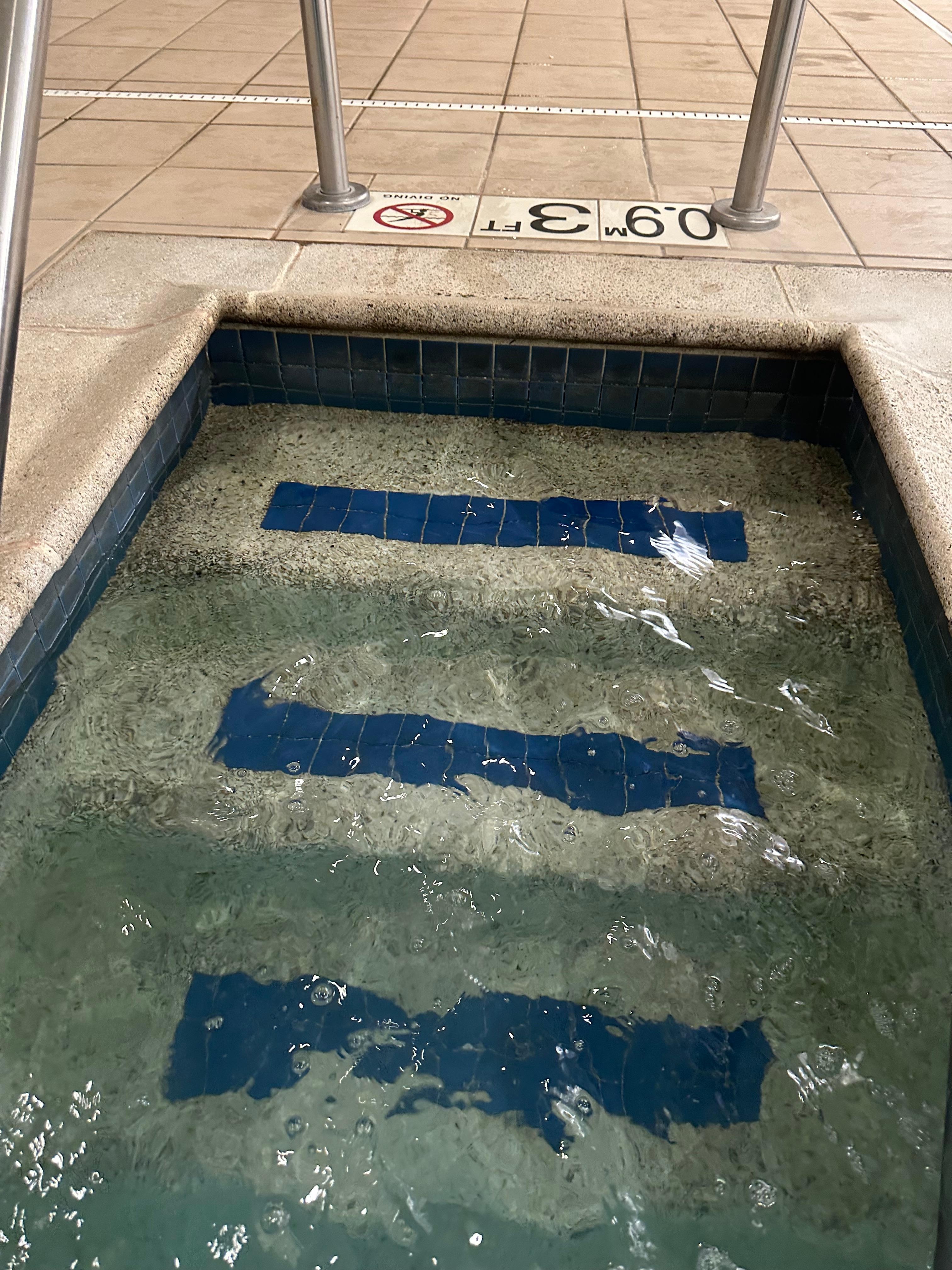 Stairs entrance to hot tub 