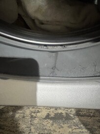 Hair in door seal on washer/dryer