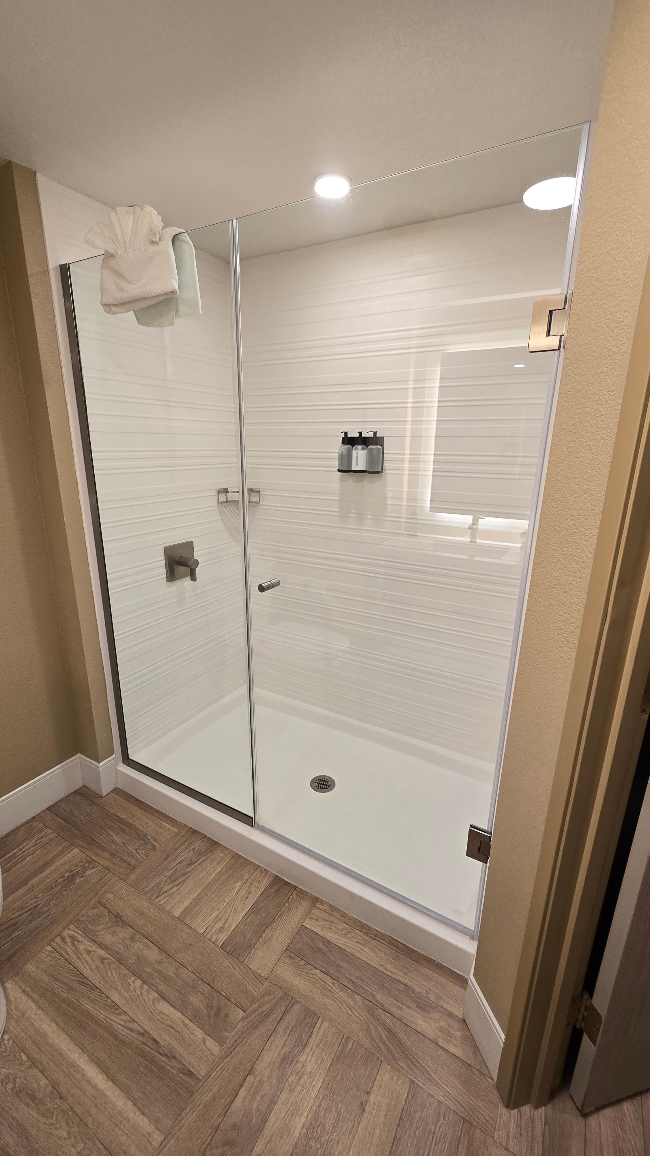 Walk in shower seemed brand new and the bathroom was sparkling clean