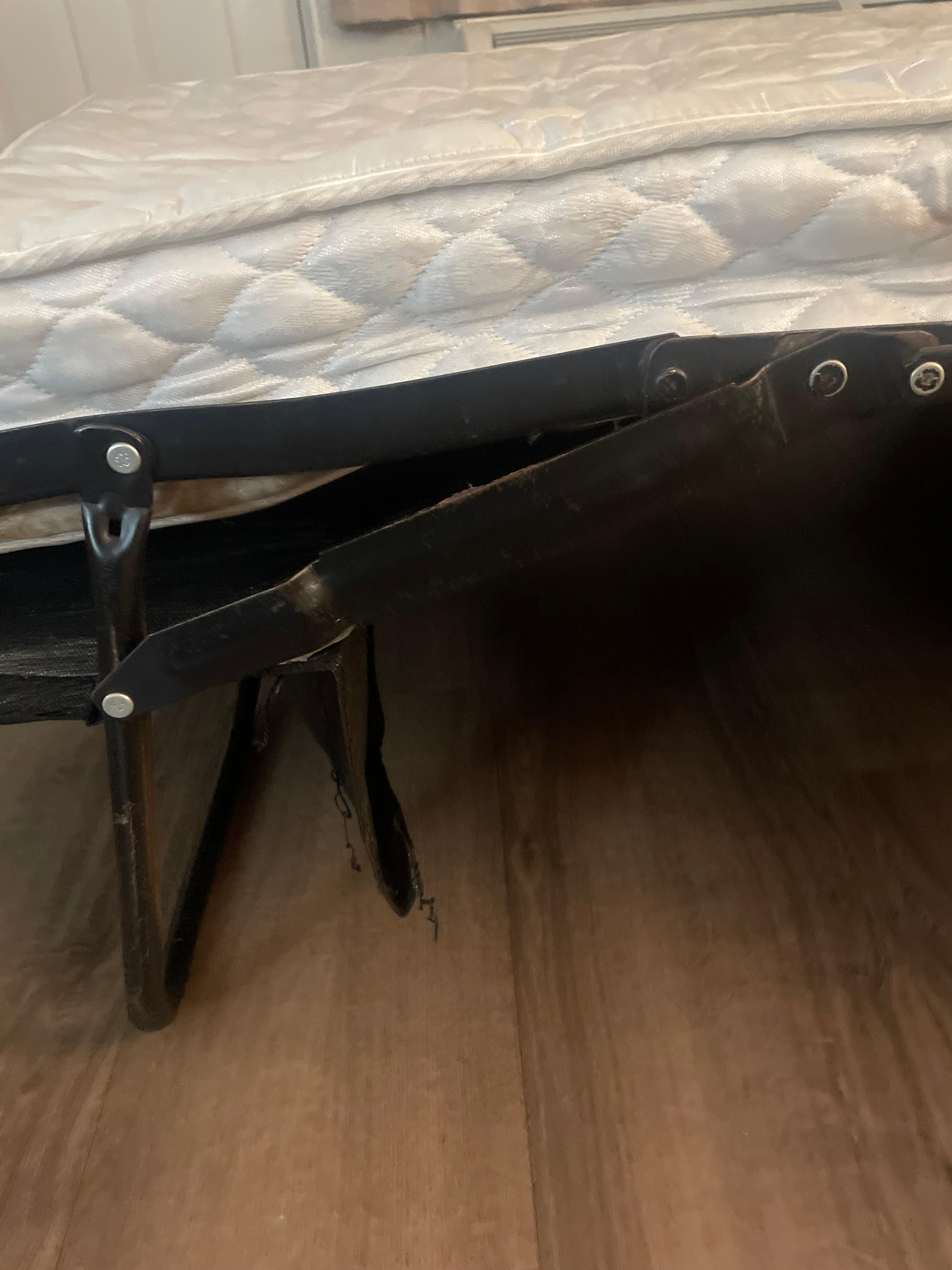 Couch bed was rusted, mattress was sunk in and. Stains were everywhere on the mattress