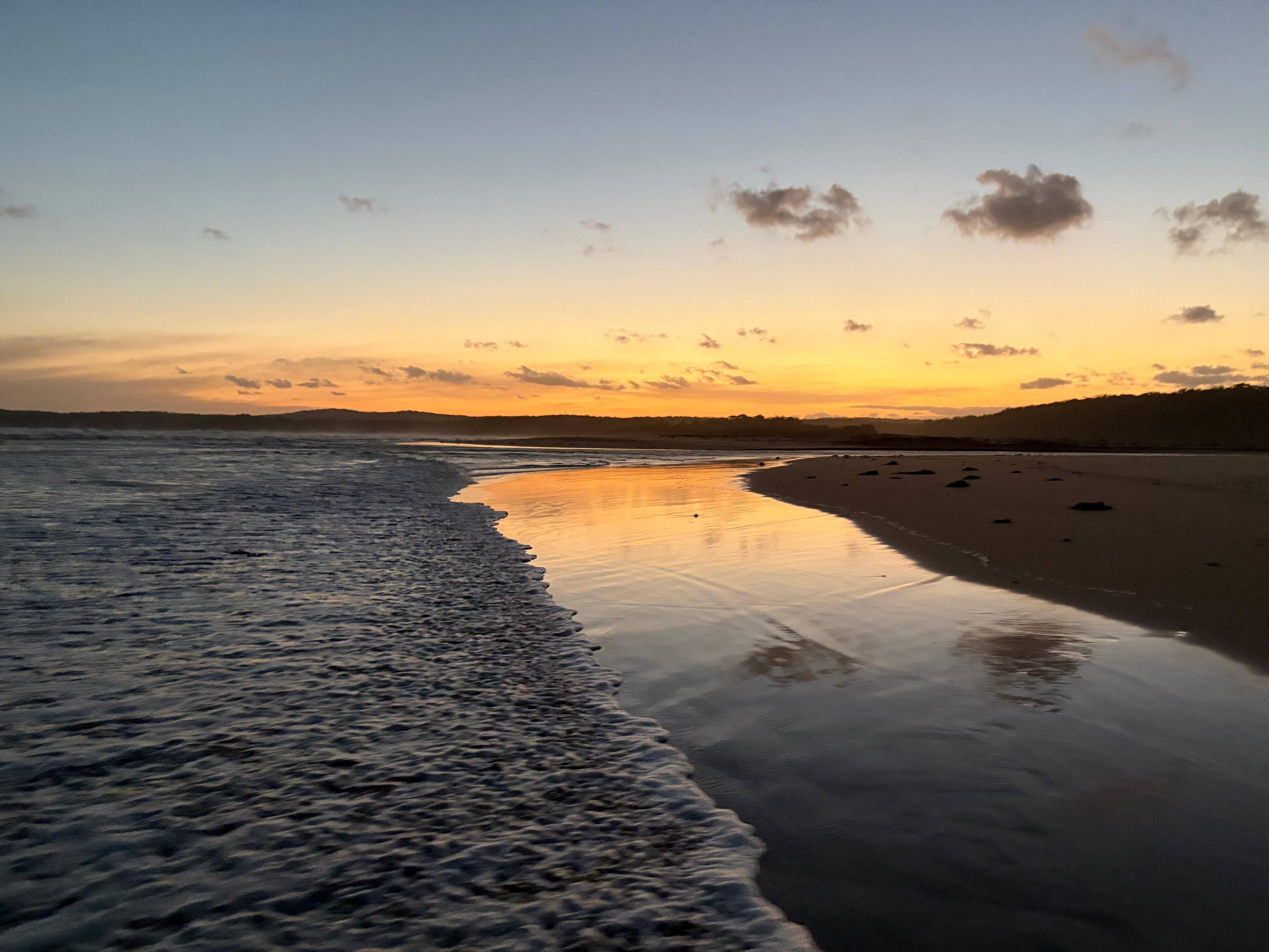 Sunset at North Durras beach, near river mouth