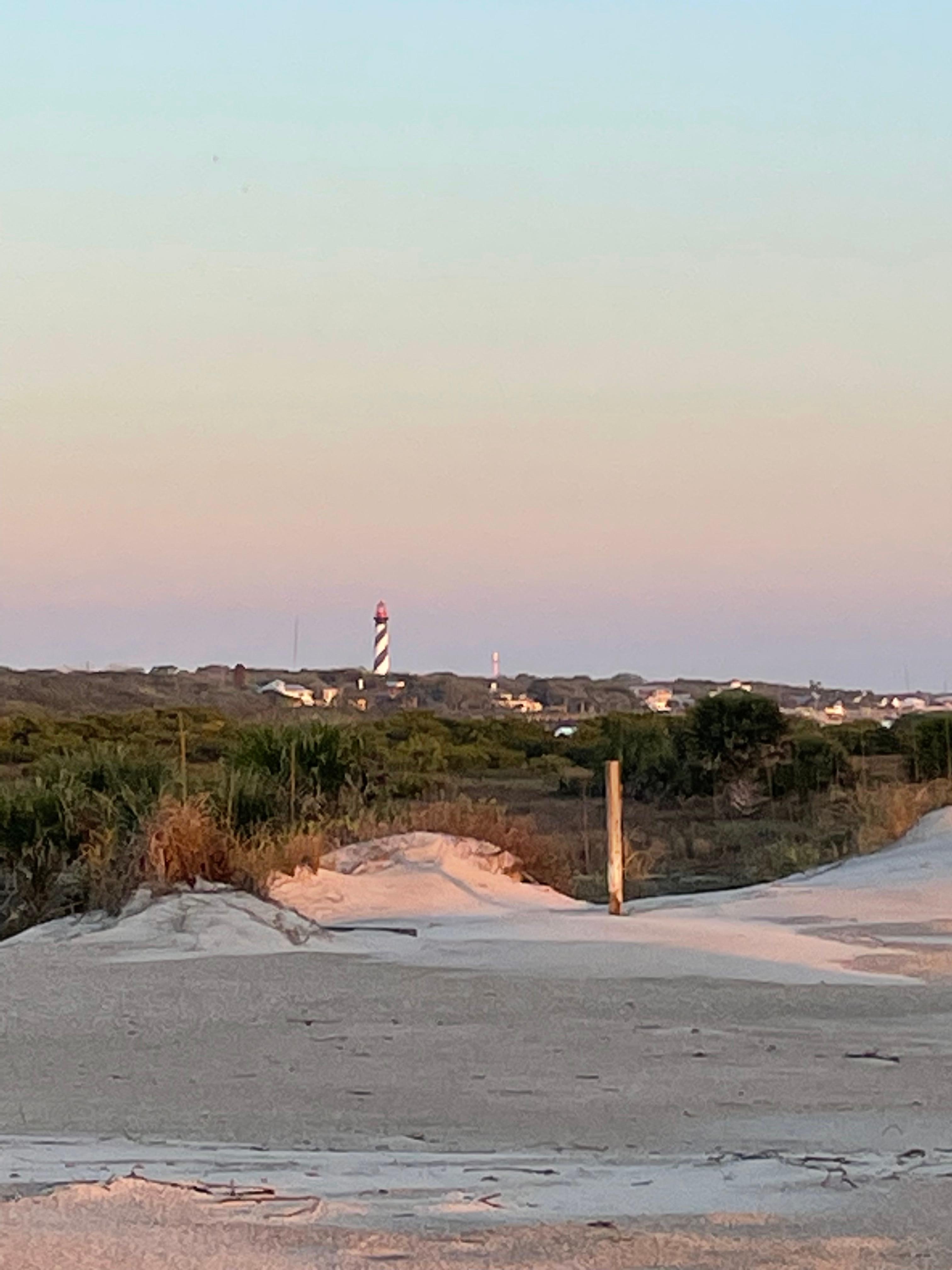 Hike north on the beach 1/2 mile to see the lighthouse from the beach