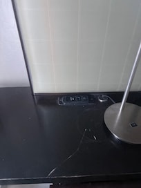 Hard to see but the outlets are blocked by the headboard and are unusable