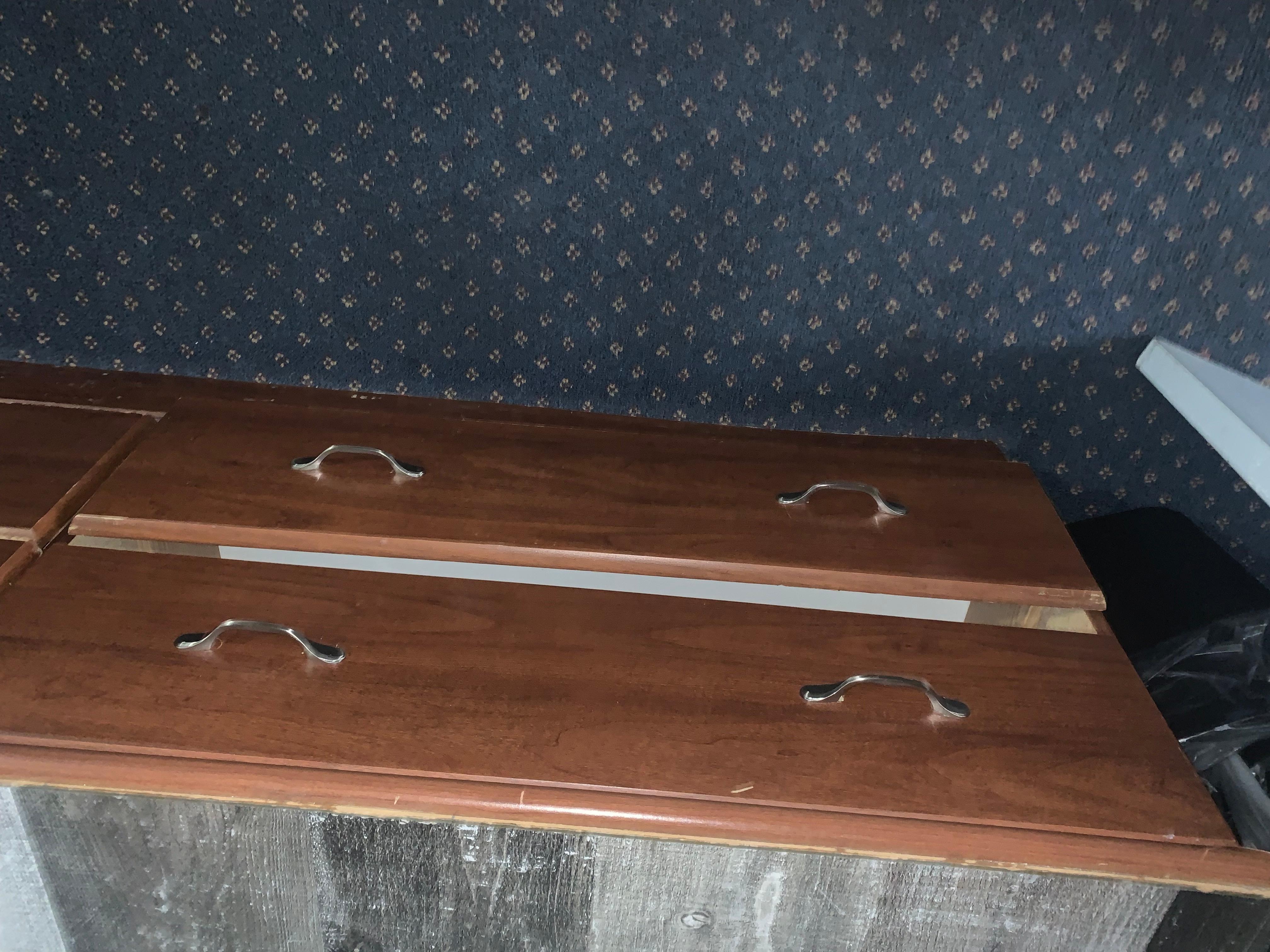 Dresser draw years broken and damaged.