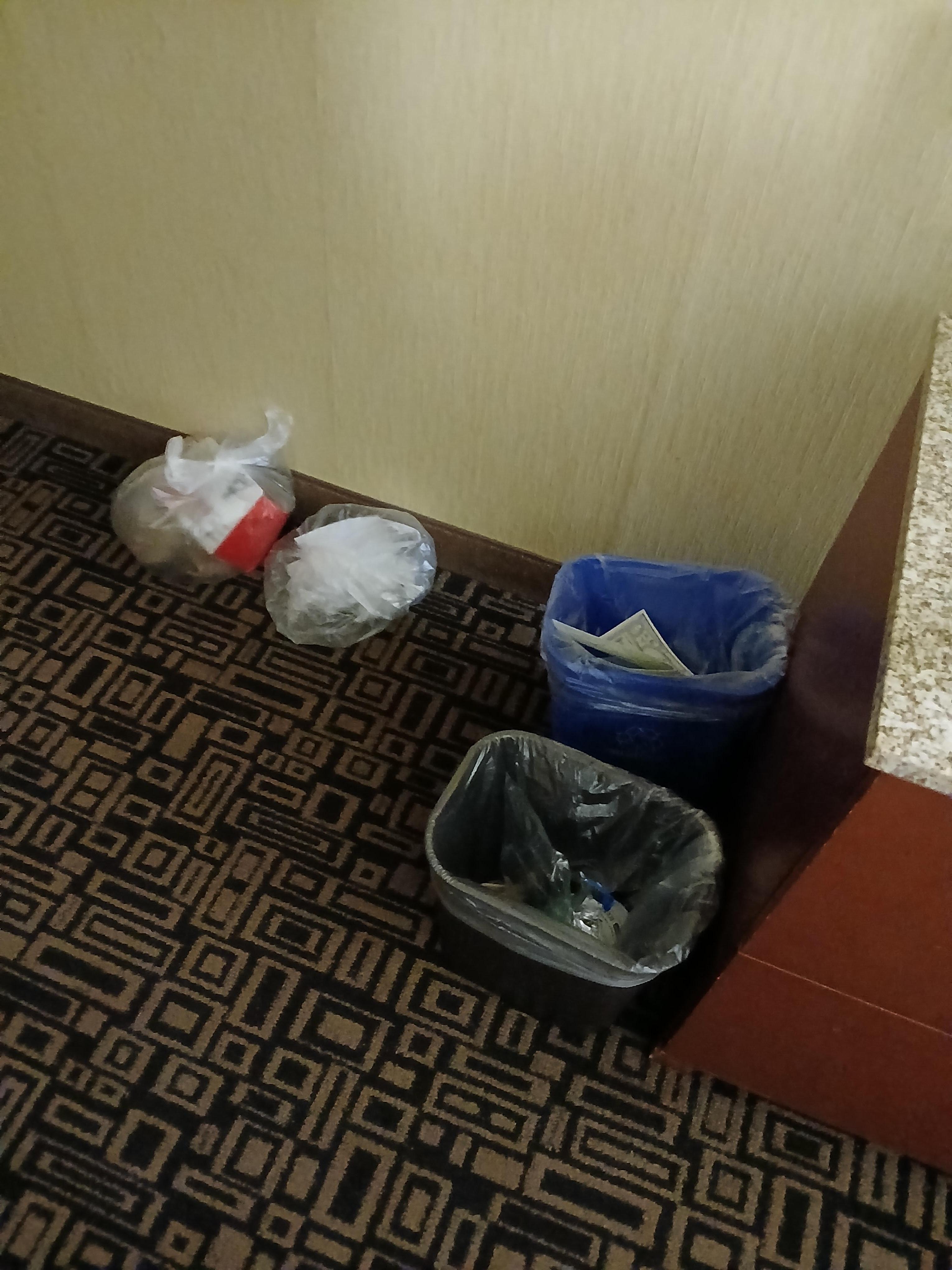 Garbage bags left in room.