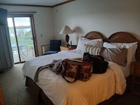 Larger bedroom. 2 bedroom suite, with patio entrance, pretty view