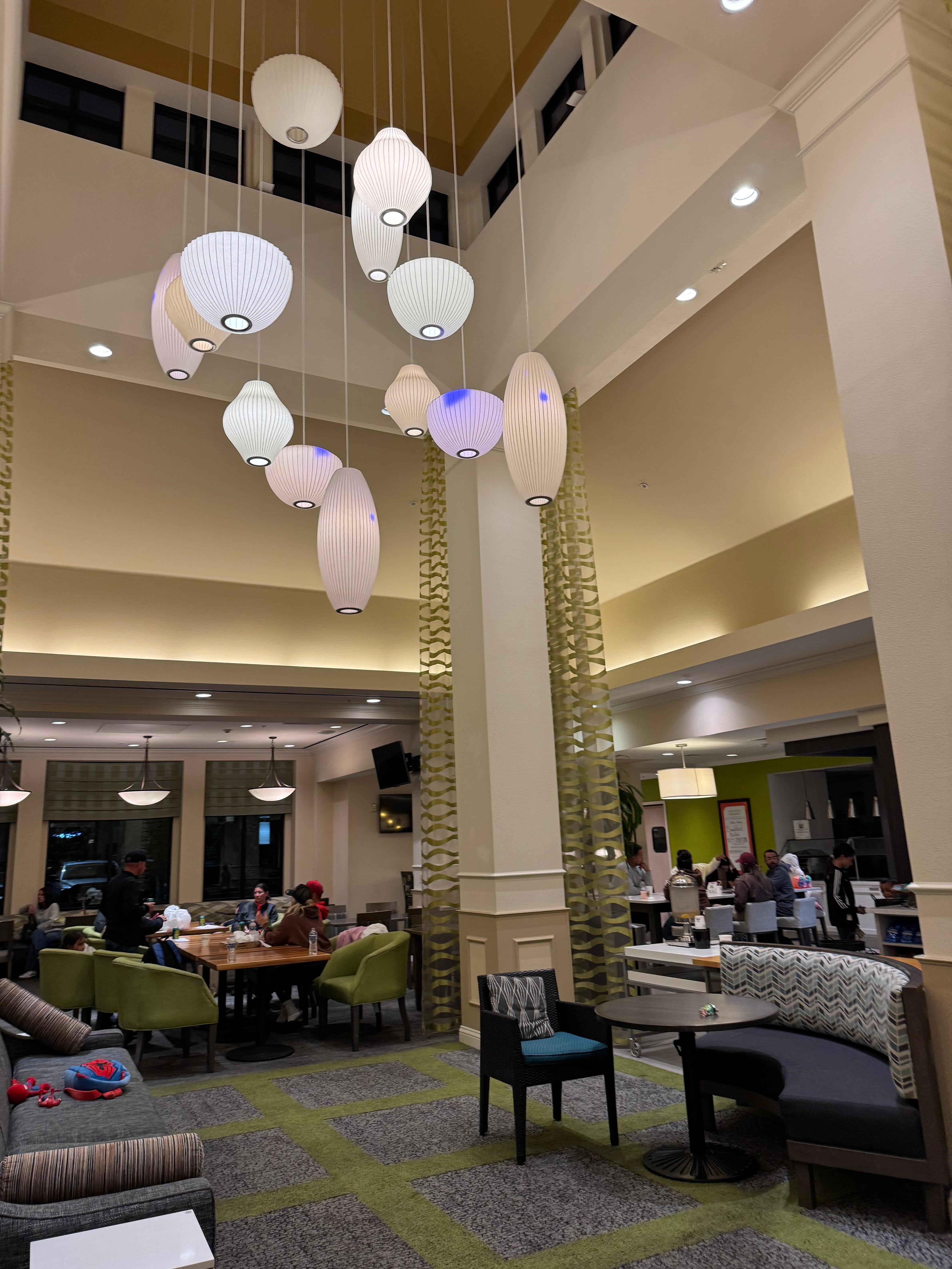 Lobby with hanging art. 