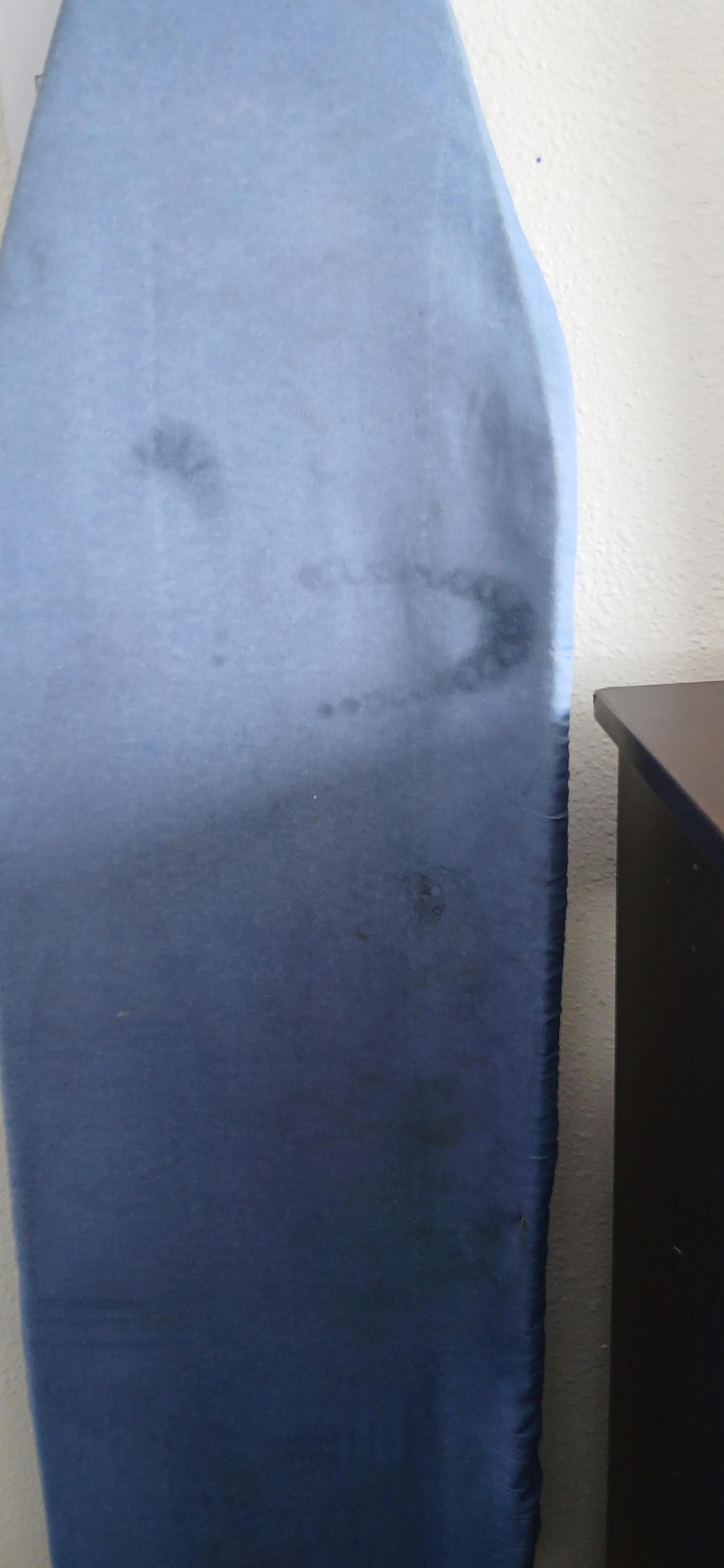 old and worn ironing board