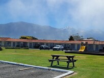 The motel has a lovely view of the mountains.