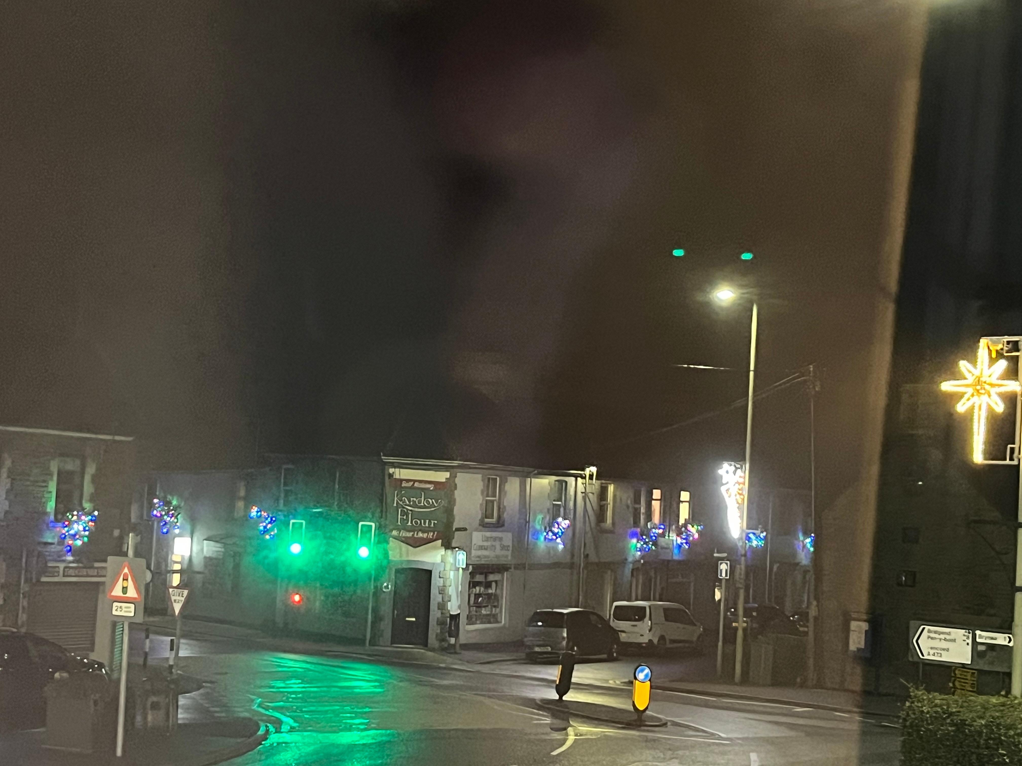 Pedestian crossing nect to charity by the China take away