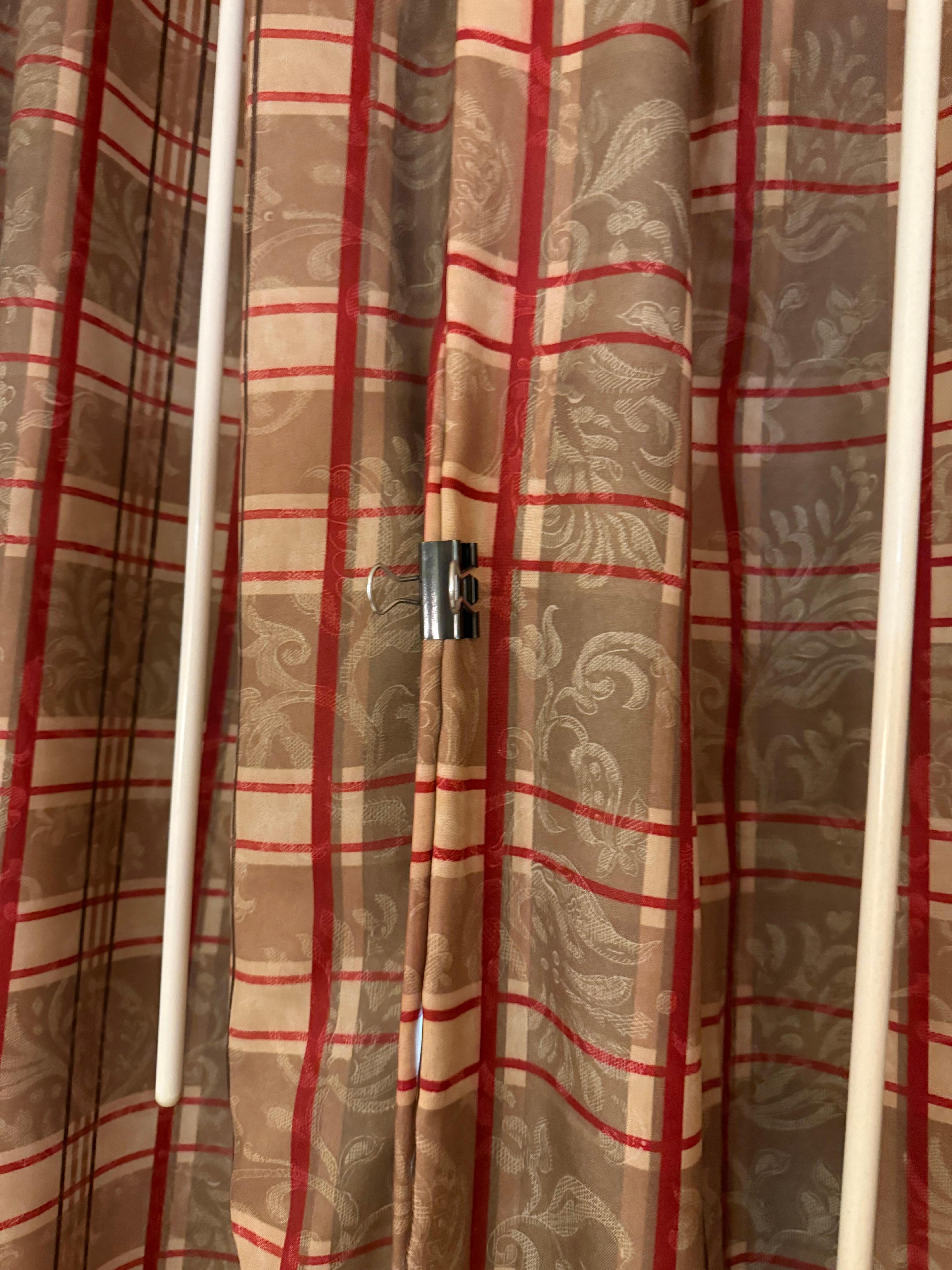 Curtains held together with a clip!