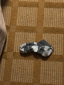 Someone’s sock left in the room from previous stays.
