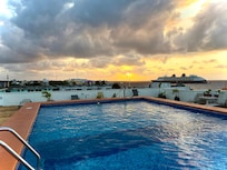 5th floor rooftop sunset ocean view and cruise ship in distance
