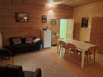 communal sitting/eating area with fridge & kettle