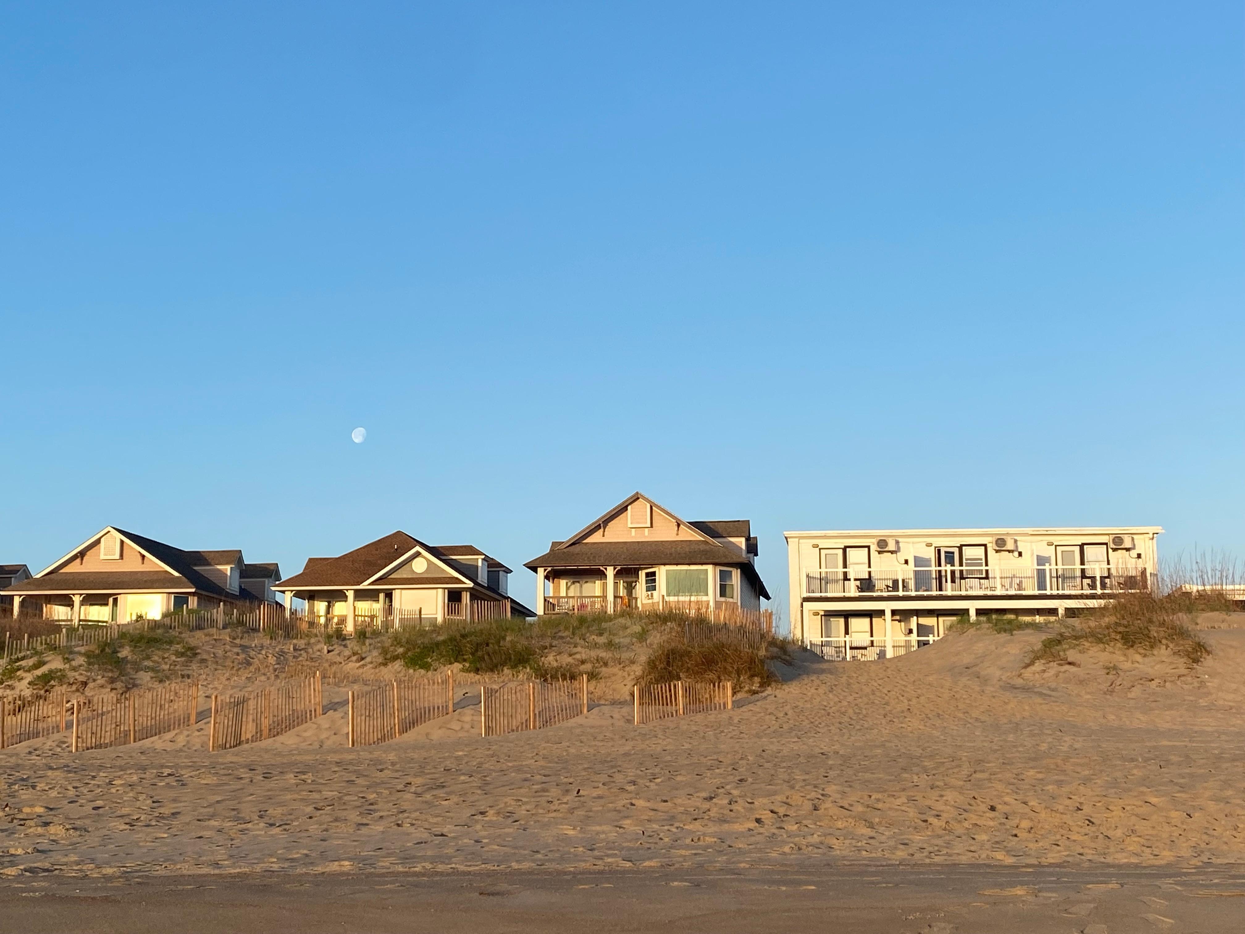 The hotel viewed from the beach is on the right.