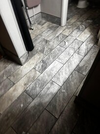 Bathroom light fixture was full of water and fell very close to my children was offered another room but no discount